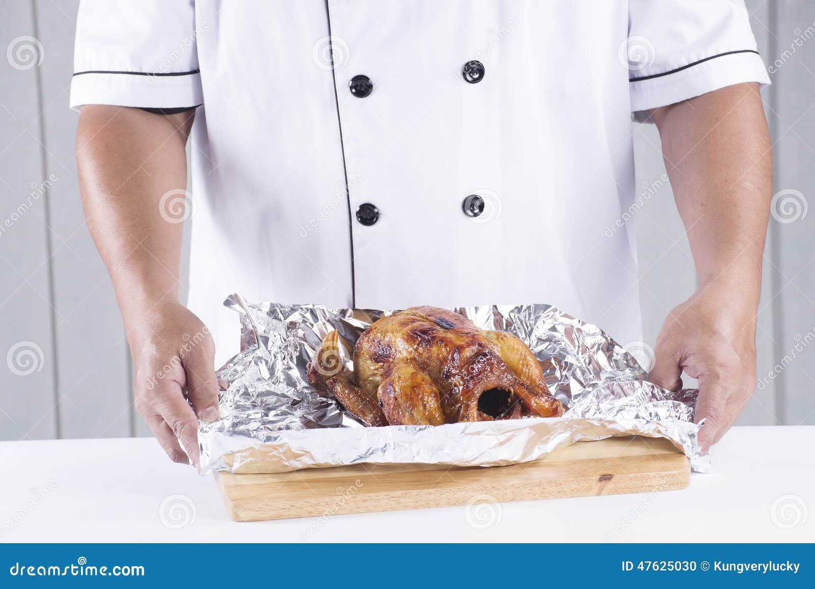 Chef Presented Roast Chicken Stock Photo - Image of baking, tomato ...