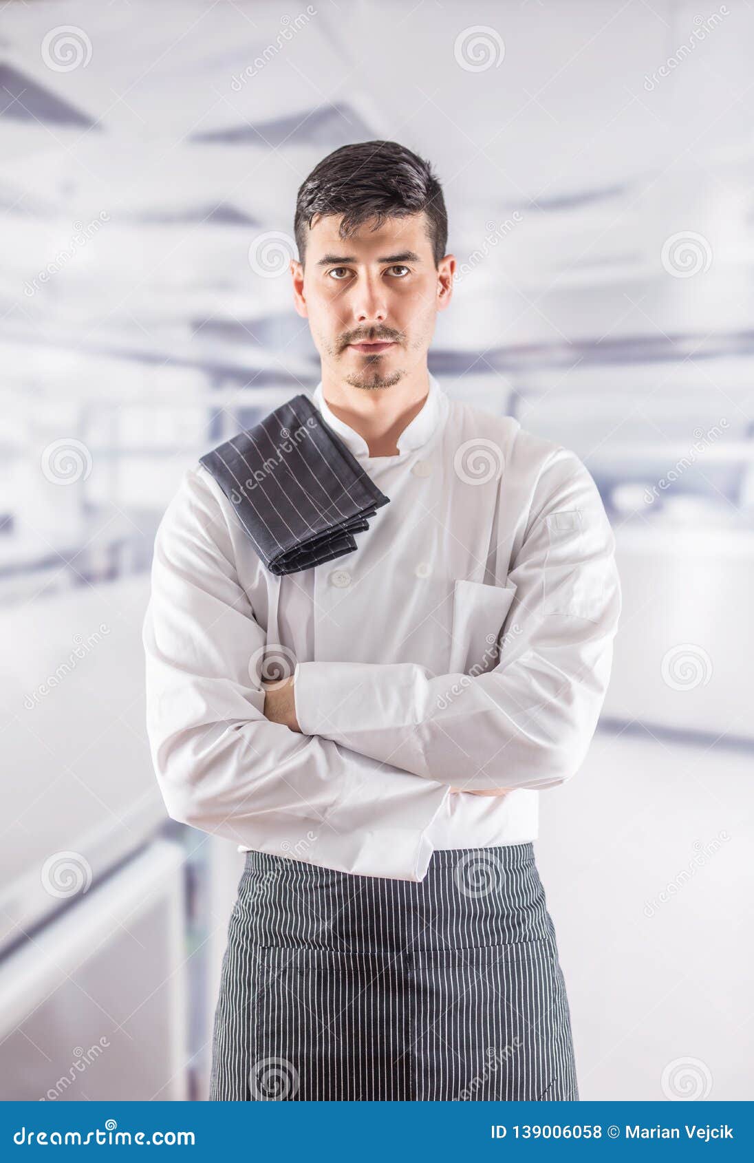 Chef Professional in Restaurant Kitchen Standing with Towel on Shoulder ...