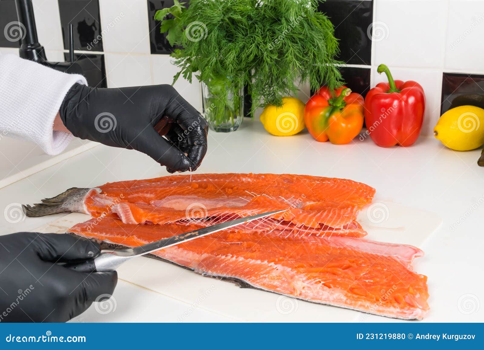 The Chef Pulls Out Bones from a Red Fish Fillet Stock Photo - Image of ...