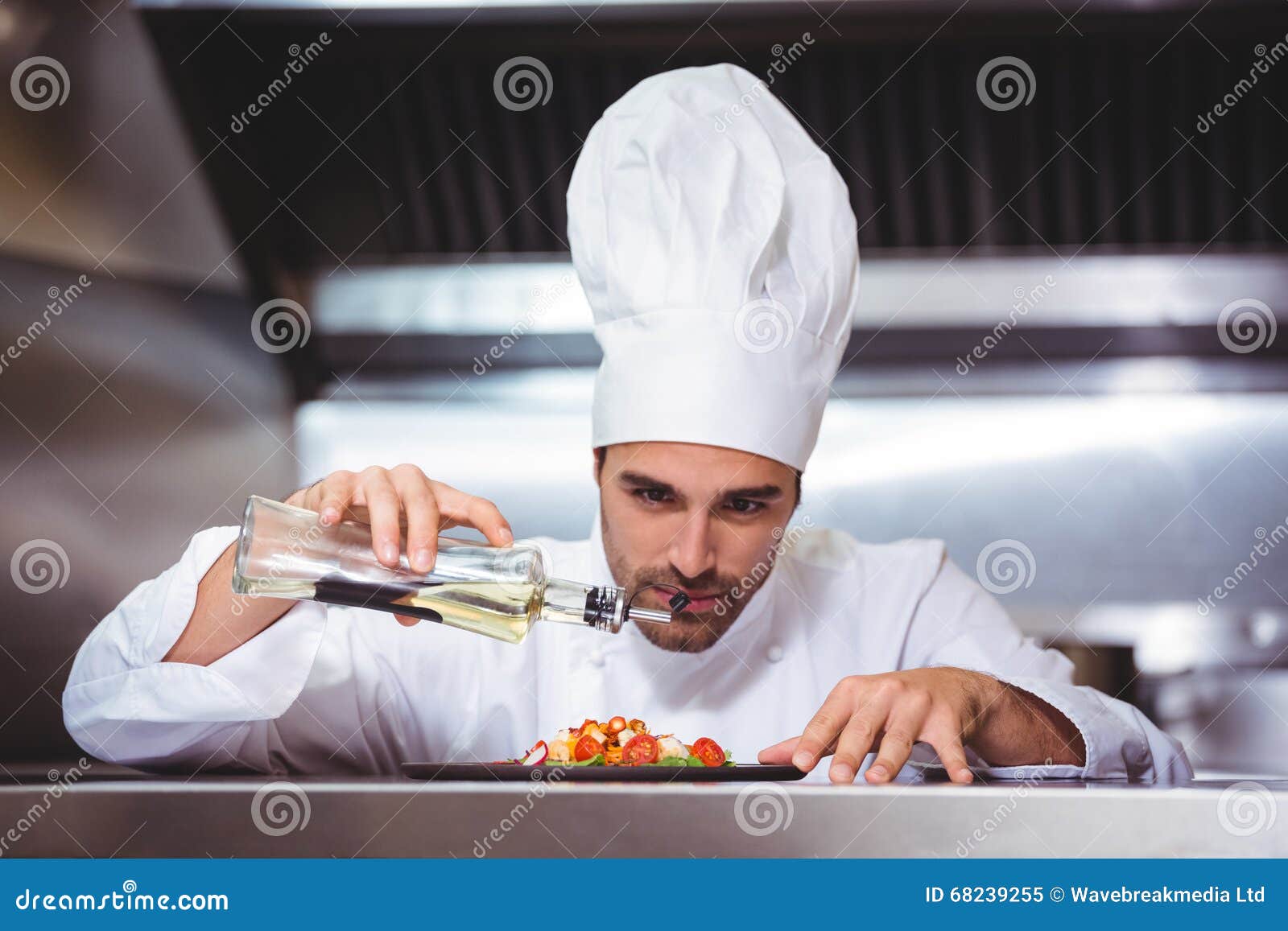 Chef Putting Finishing Touch on Salad Stock Image - Image of profession ...