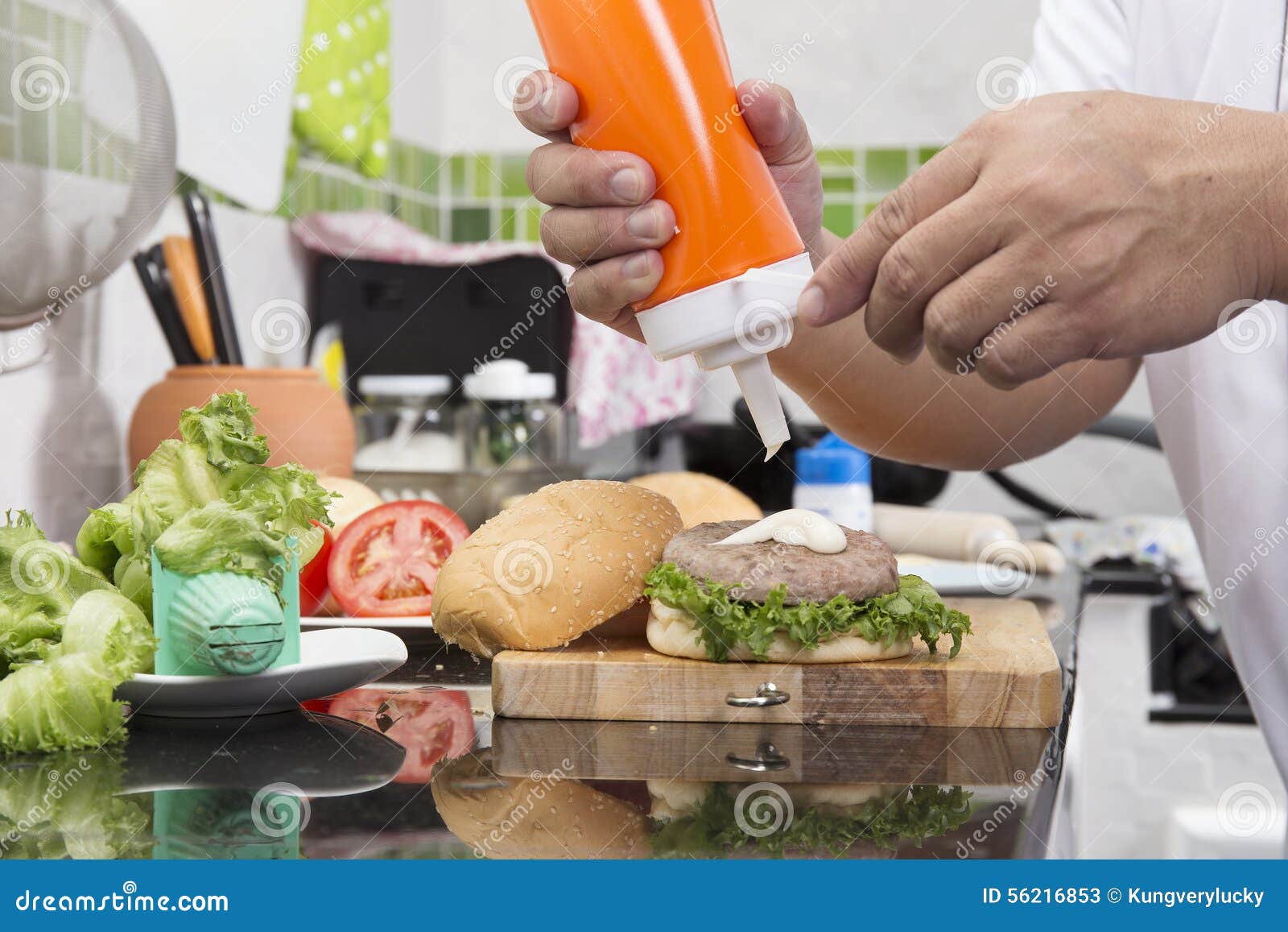 Chef Putting Mayonnaise on the Hamburger Bun Stock Image - Image of ...