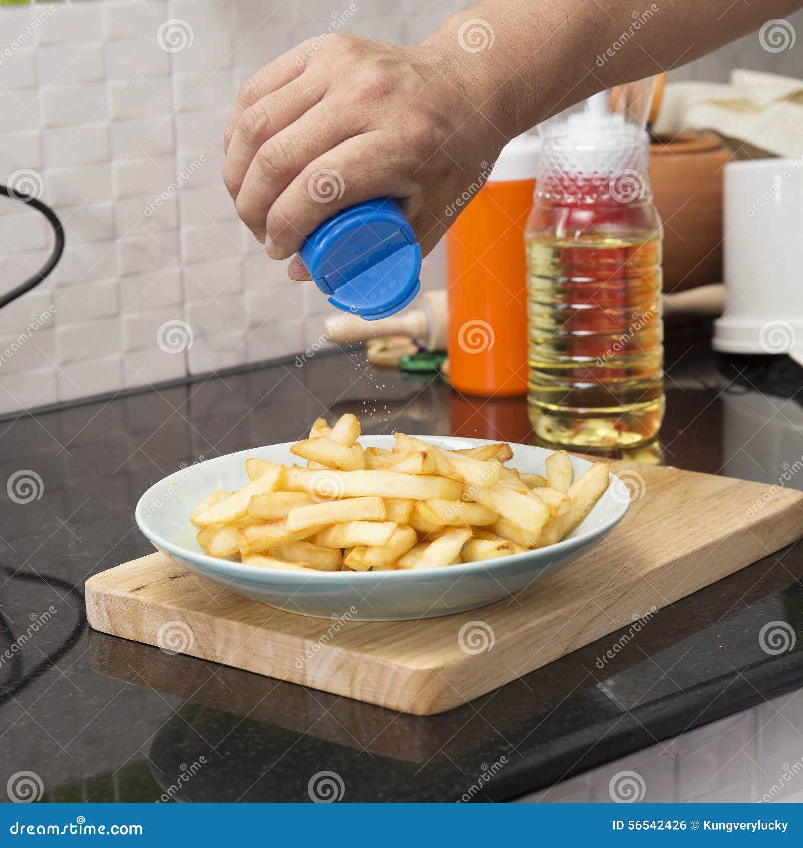 Chef Putting Salt To French Fired Stock Photo - Image of pour ...
