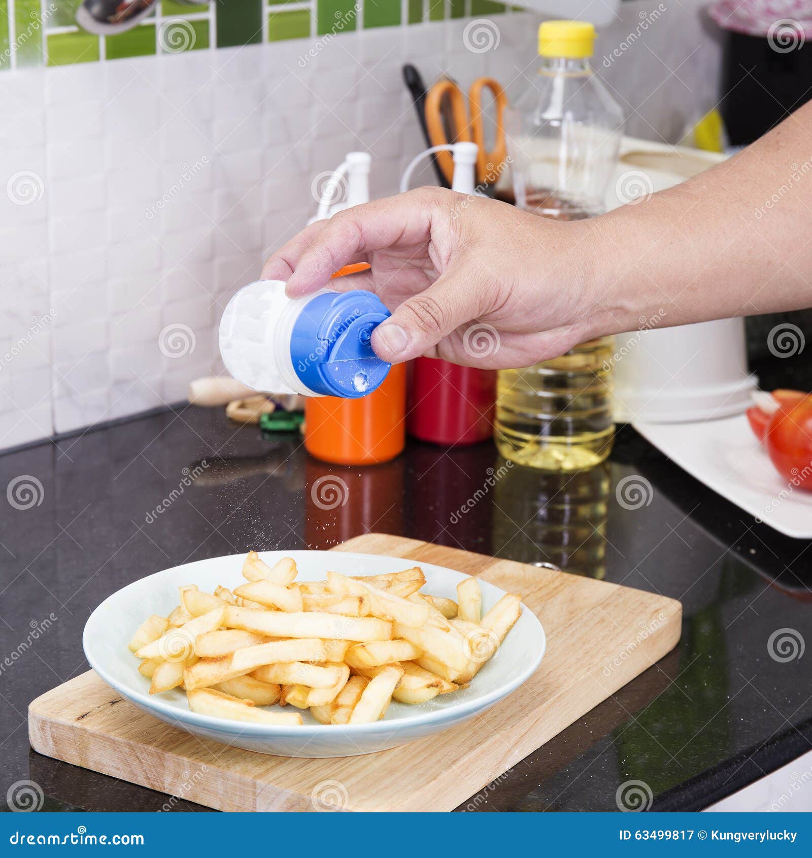 Chef Putting Salt To French Fired Stock Image - Image of sweet, metal ...