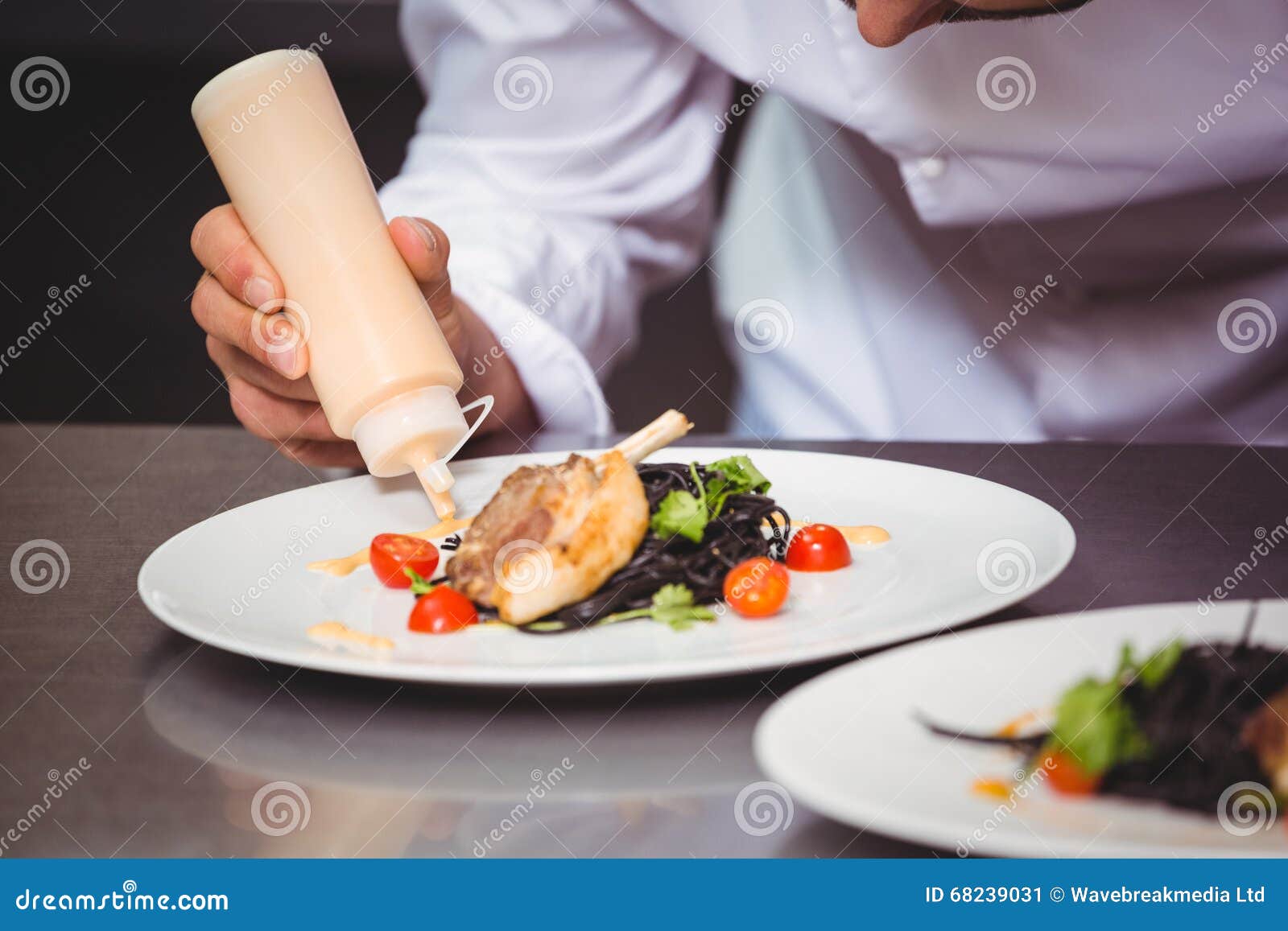 Chef Putting Sauce on a Dish Stock Image - Image of adding, preparation ...