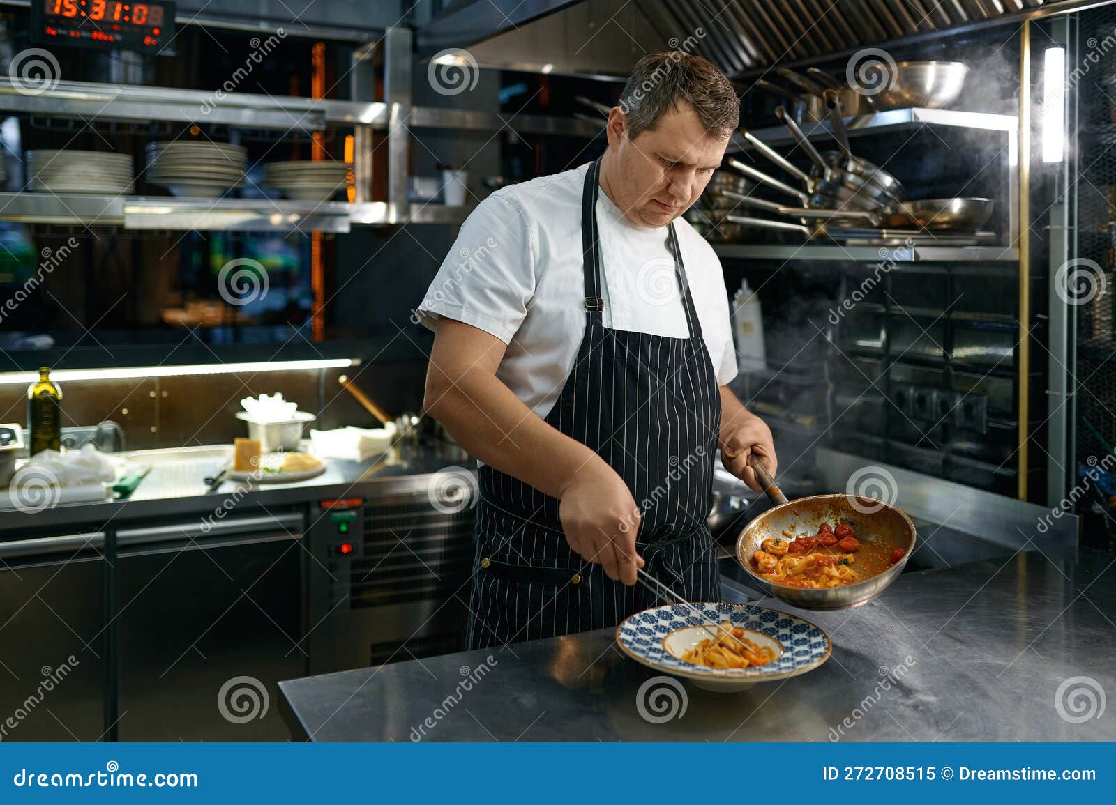 Chef Putting Spaghetti Carbonara on Plate Standing on Restaurant ...