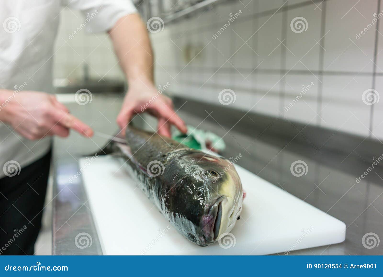 Chef in Restaurant Kitchen Filleting Carp Fish Stock Photo - Image of ...