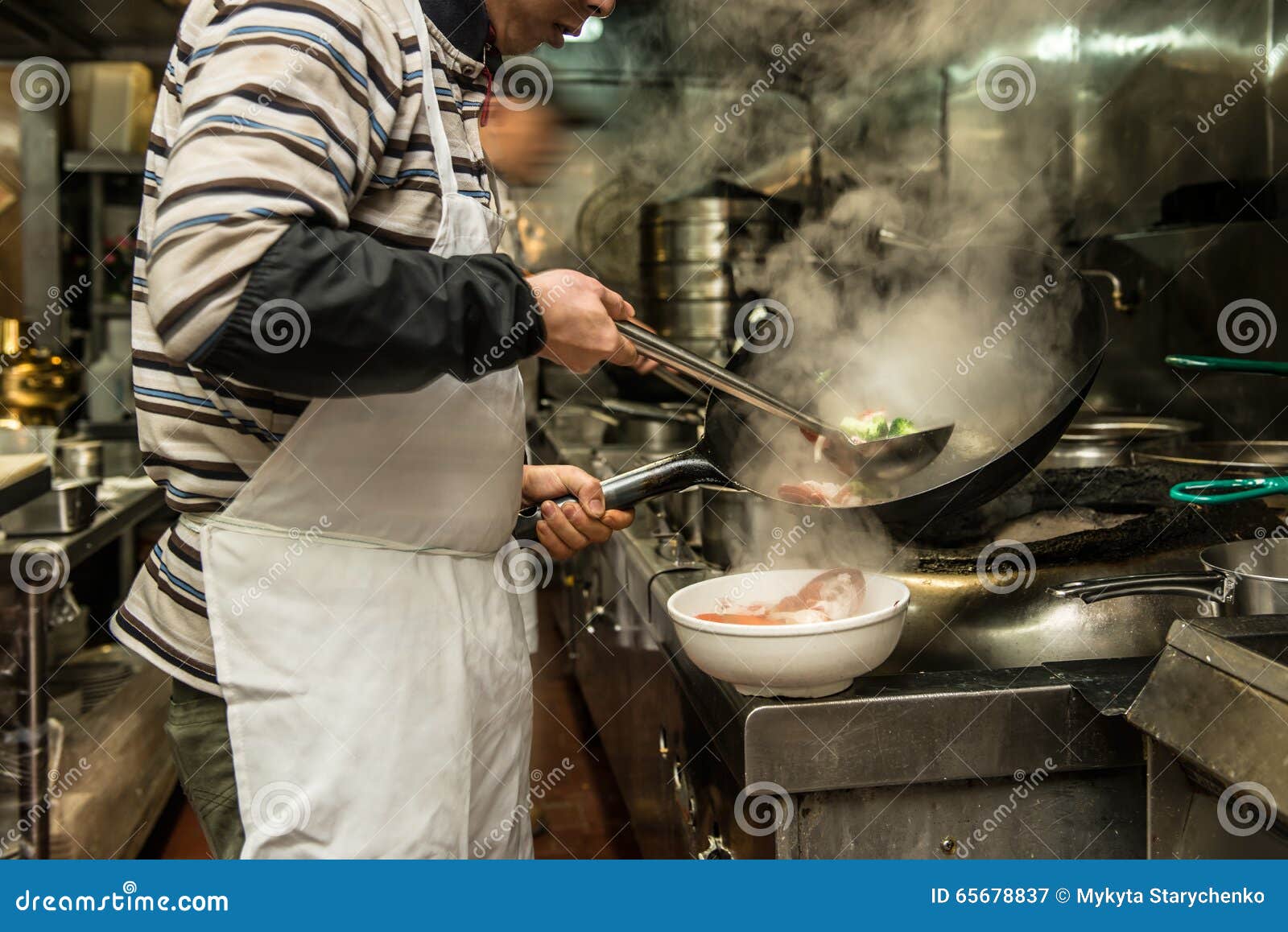 Chef in Restaurant Kitchen at Stove with Pan Stock Image - Image of ...