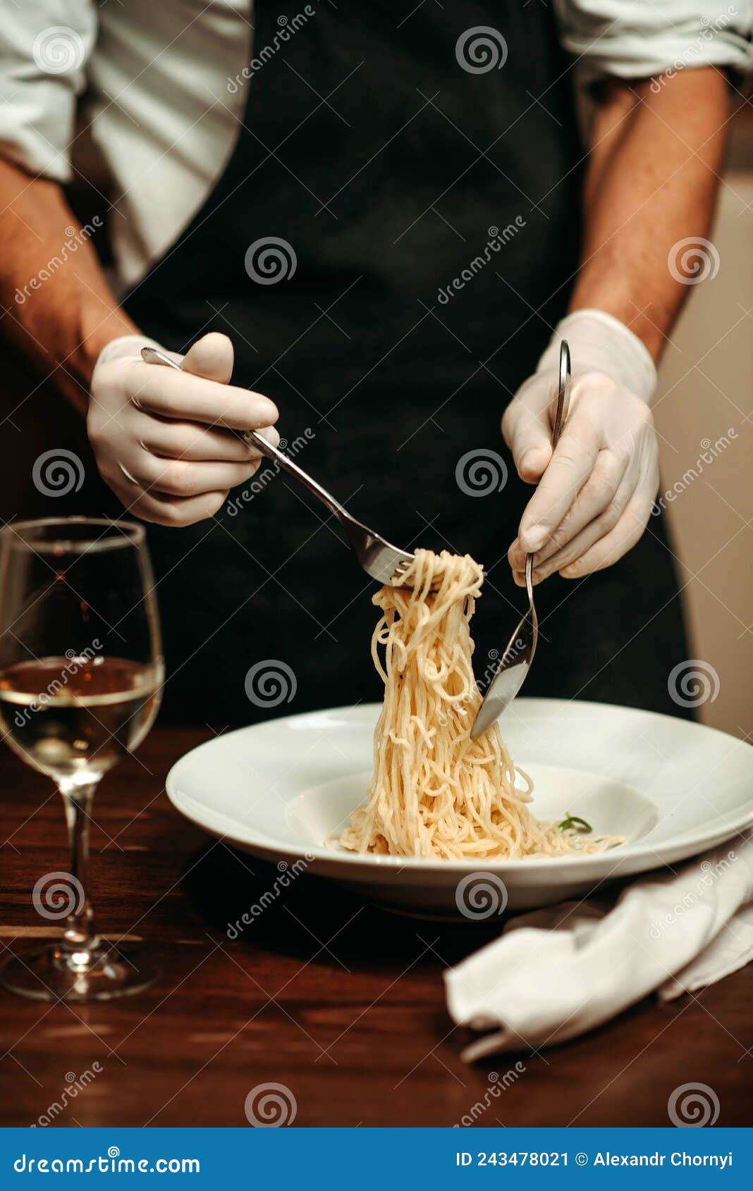 The Chef in the Restaurant Shows How To Eat Spaghetti Stock Image ...