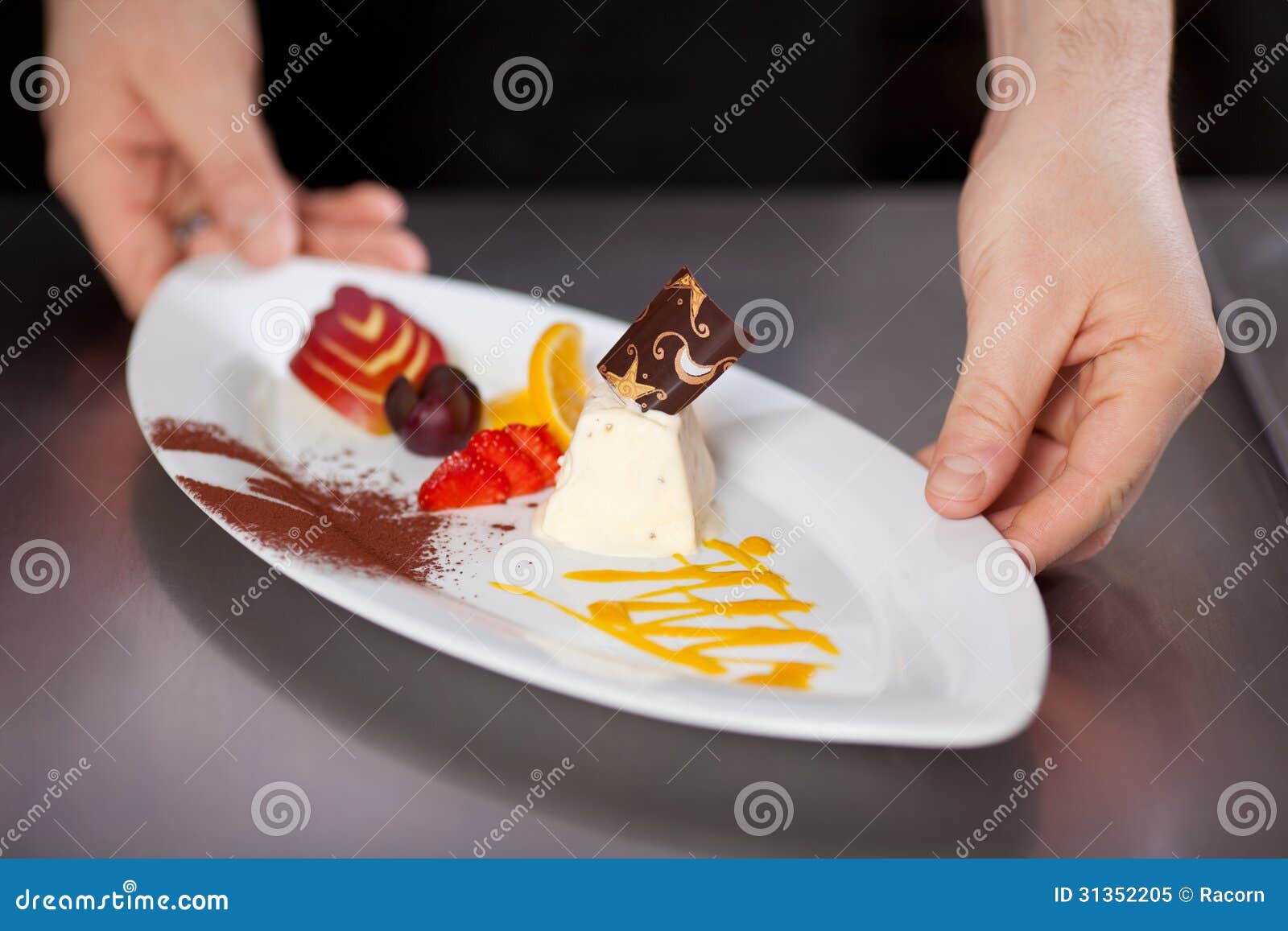 Chef S Hands Presenting Dish at Kitchen Counter Stock Image - Image of ...