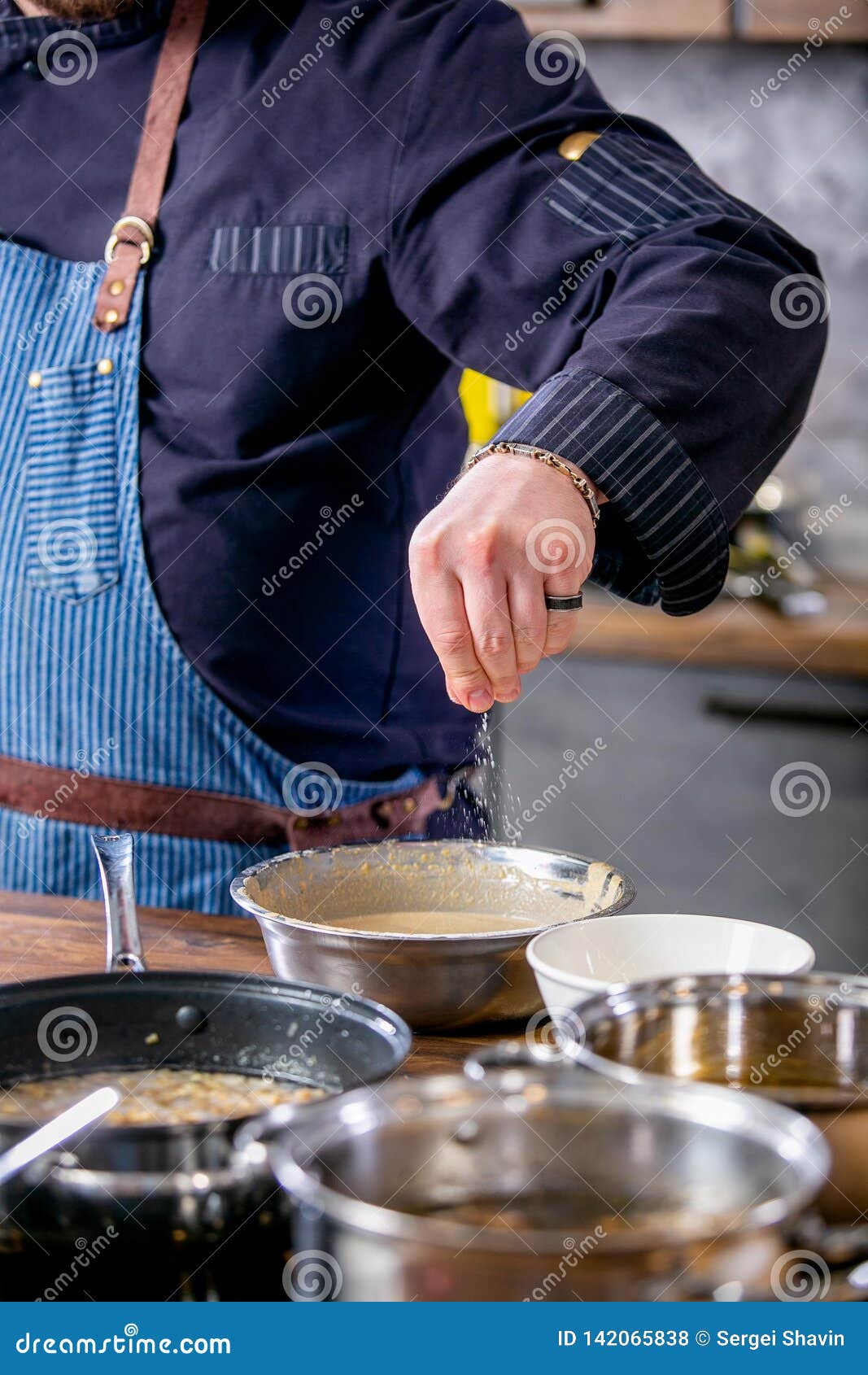 Chef Salting the Batter. Master Class in the Kitchen. the Process of ...