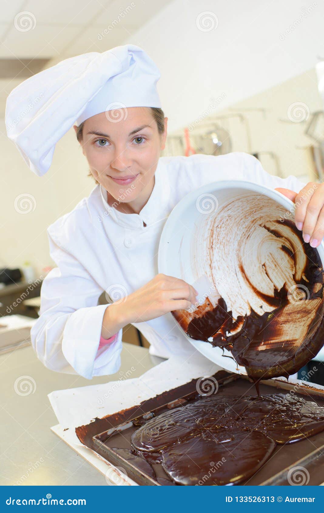 Chef Scraping Chocolate Mixture into Baking Tray Stock Image - Image of ...