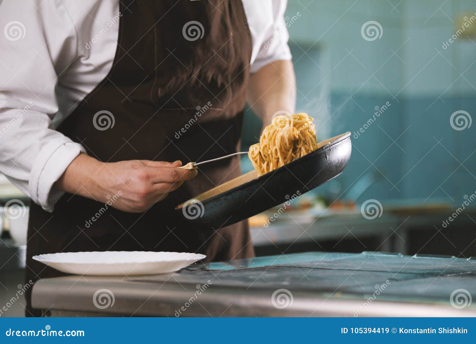 Chef Serves Spaghetti on the Plate Stock Image - Image of cooked ...