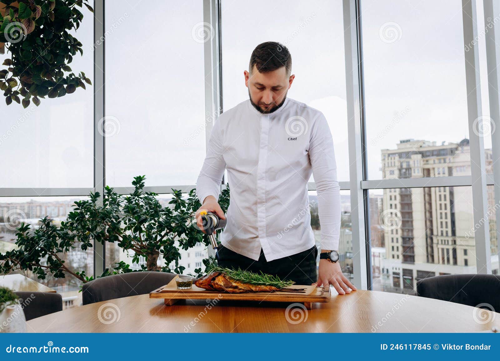 Chef Serving Freshly Delicious River Carp Fish in the Restaurant Hall ...