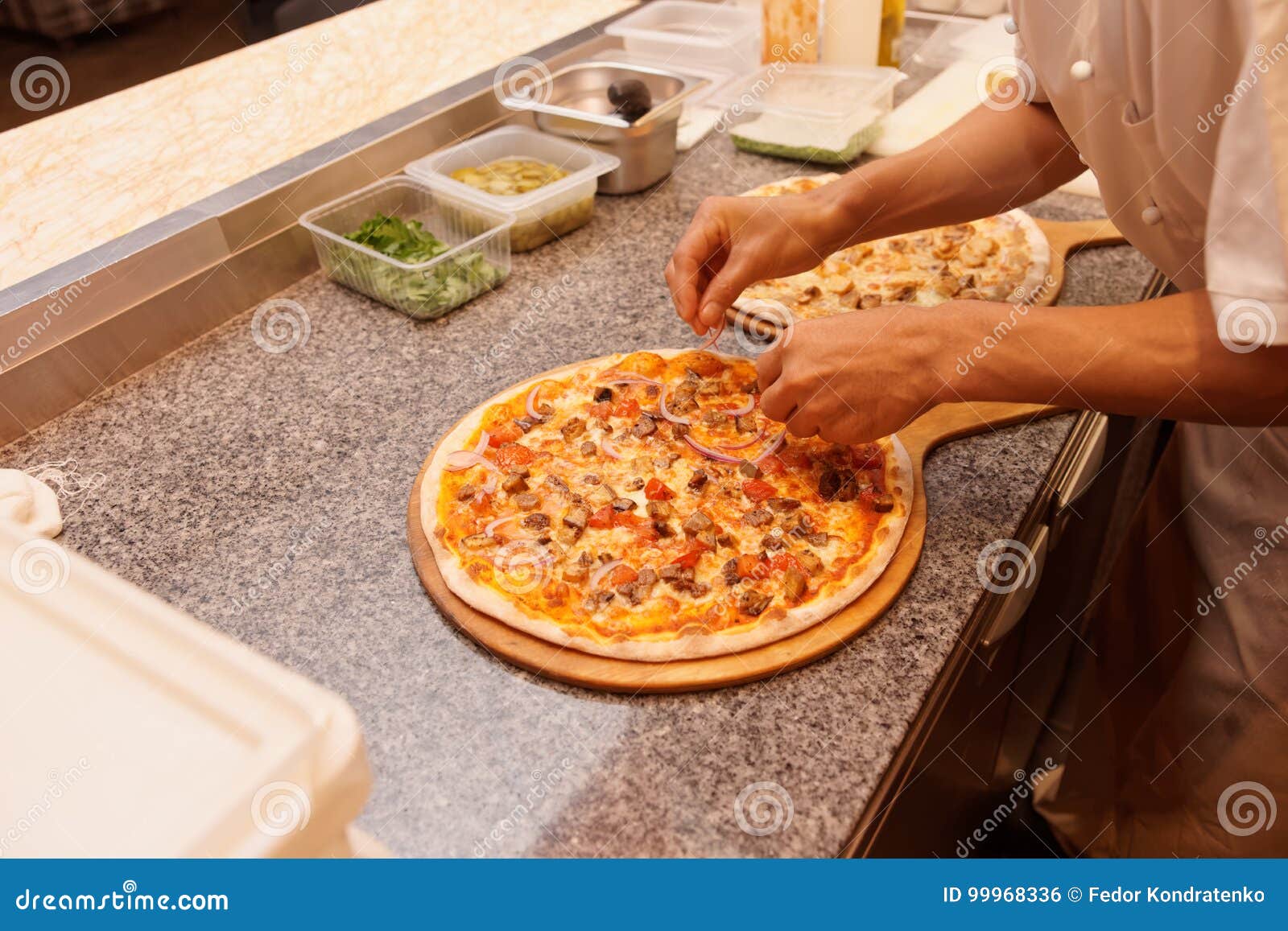 Chef is serving pizza stock photo. Image of pizza, commercial - 99968336