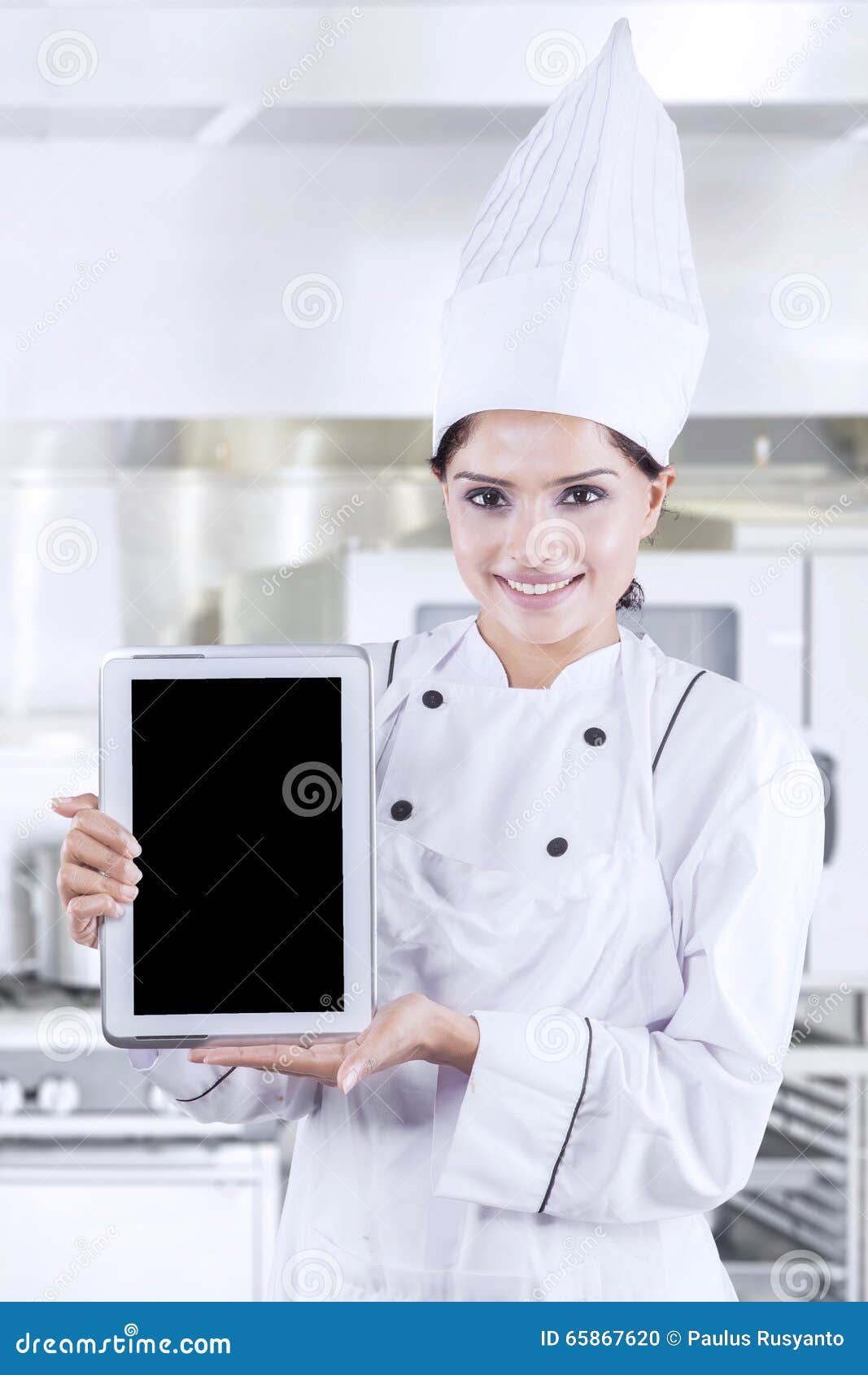 Chef Showing Digital Tablet in the Kitchen Stock Photo - Image of ...