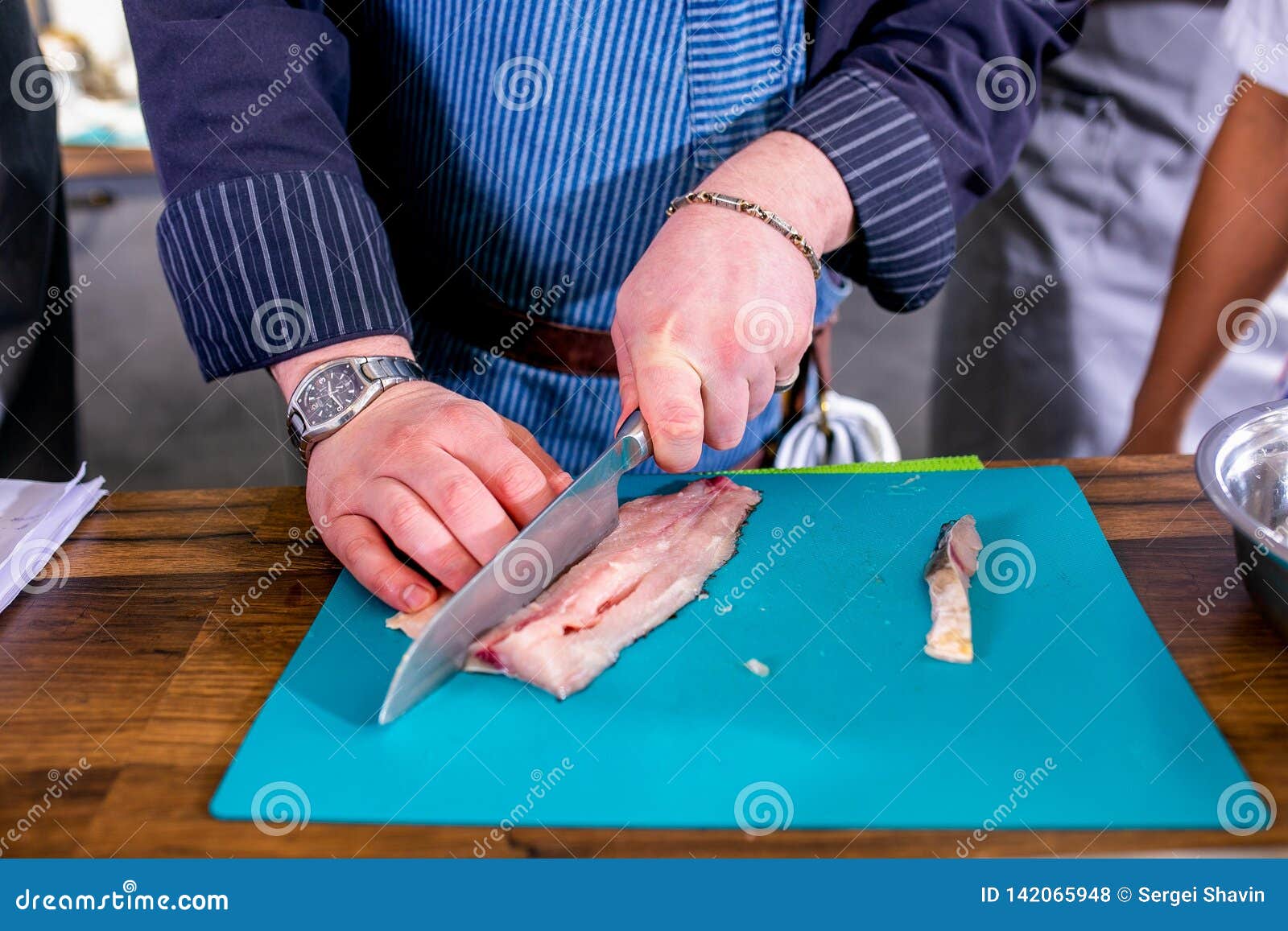 Chef Shows How To Cut Fish. Master Class in the Kitchen. the Process of ...