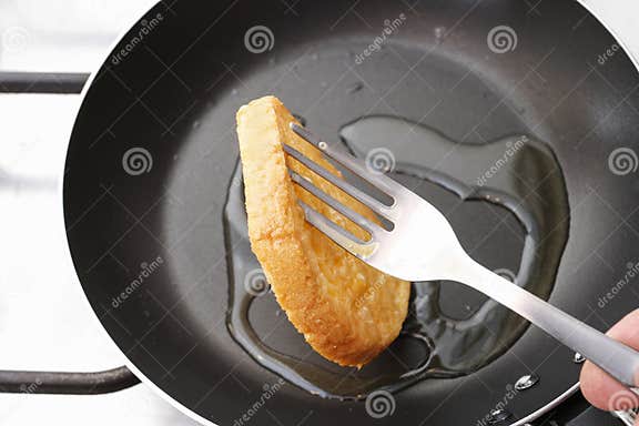 The Chef Shows How To Make French Toast Stock Photo - Image of fork ...
