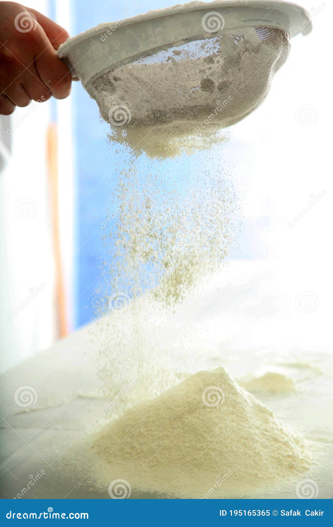 Chef sifting flour stock image. Image of gourmet, adult - 195165365