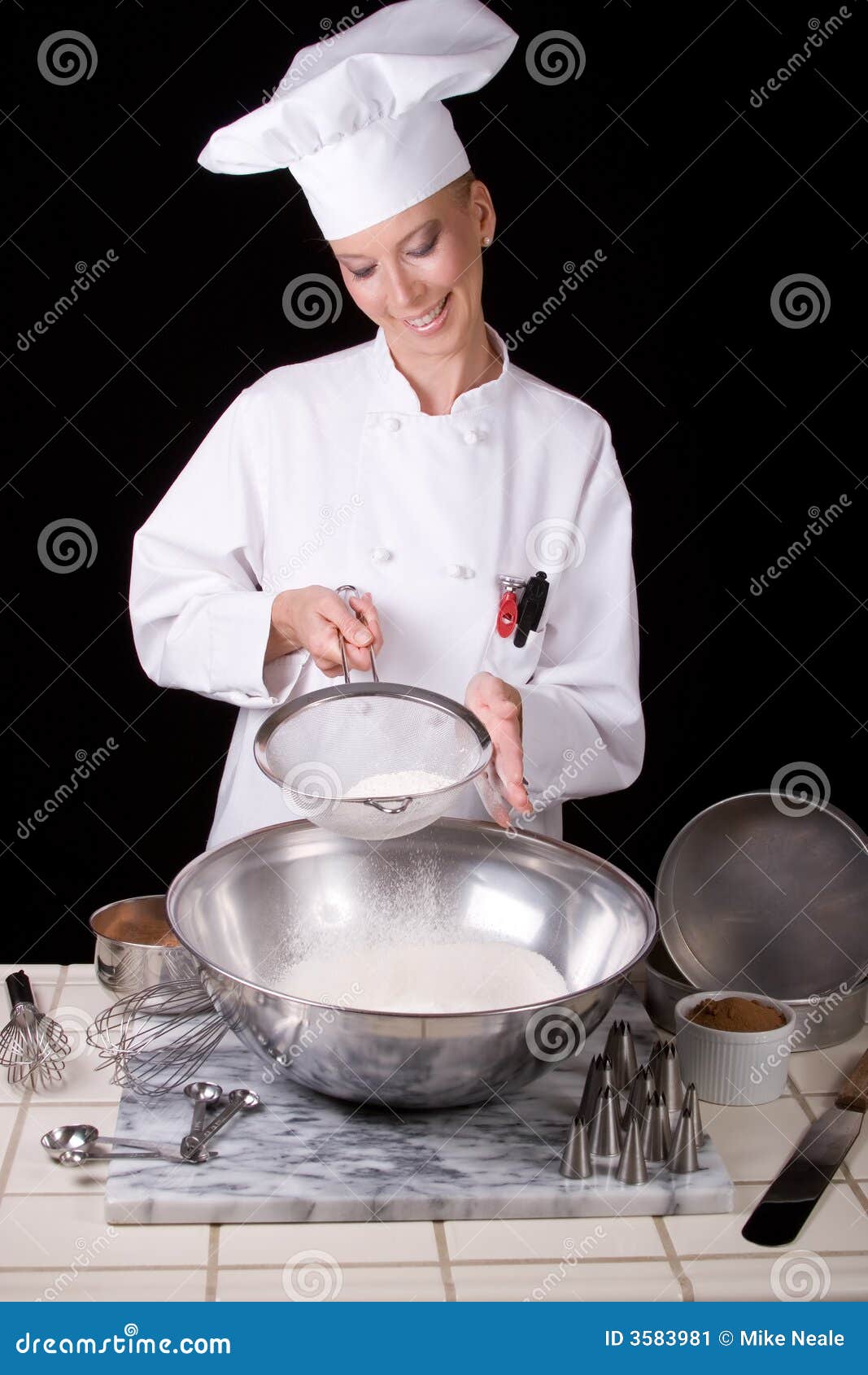 Chef Sifts Cake Flour stock image. Image of pastry, baker - 3583981