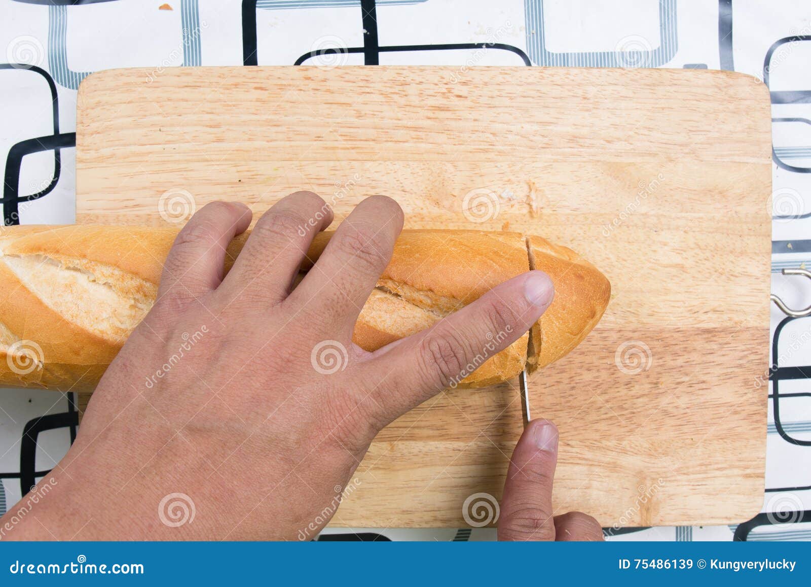 Chef slicing bread stock image. Image of hand, people - 75486139