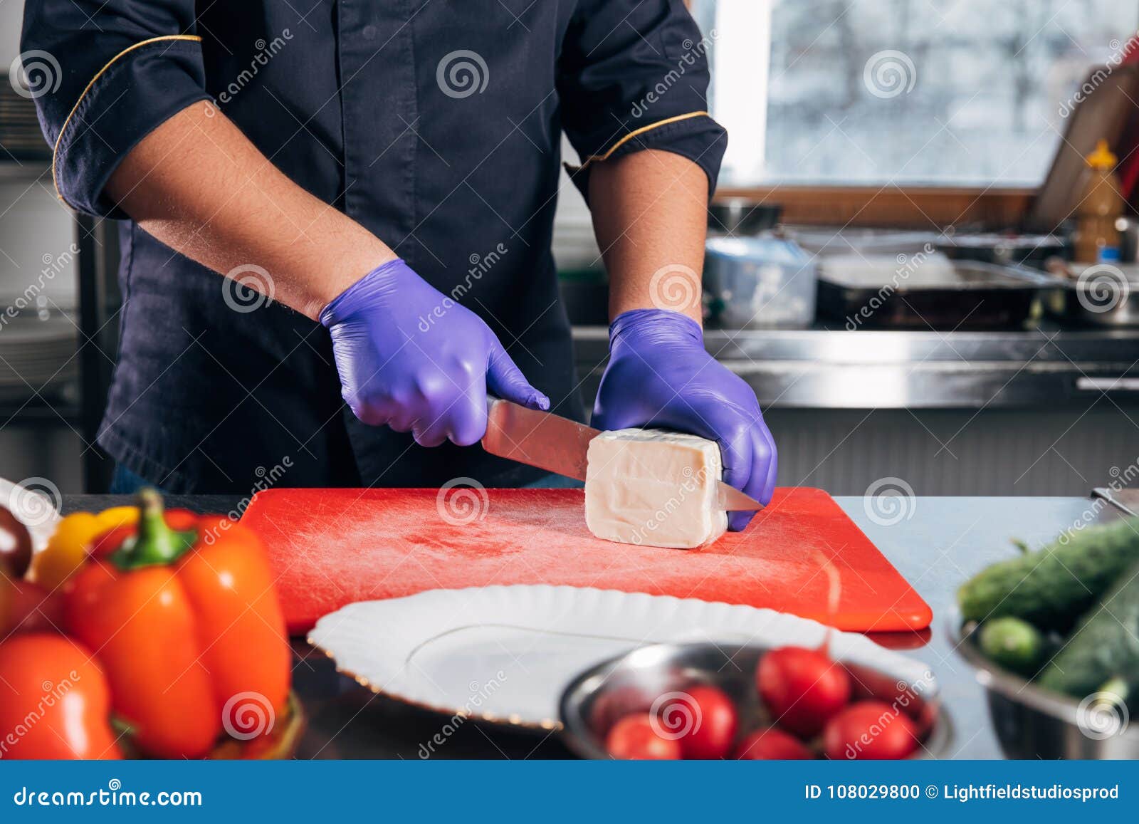 Chef Slicing Cheese at Kitchen Stock Photo - Image of process, slices ...