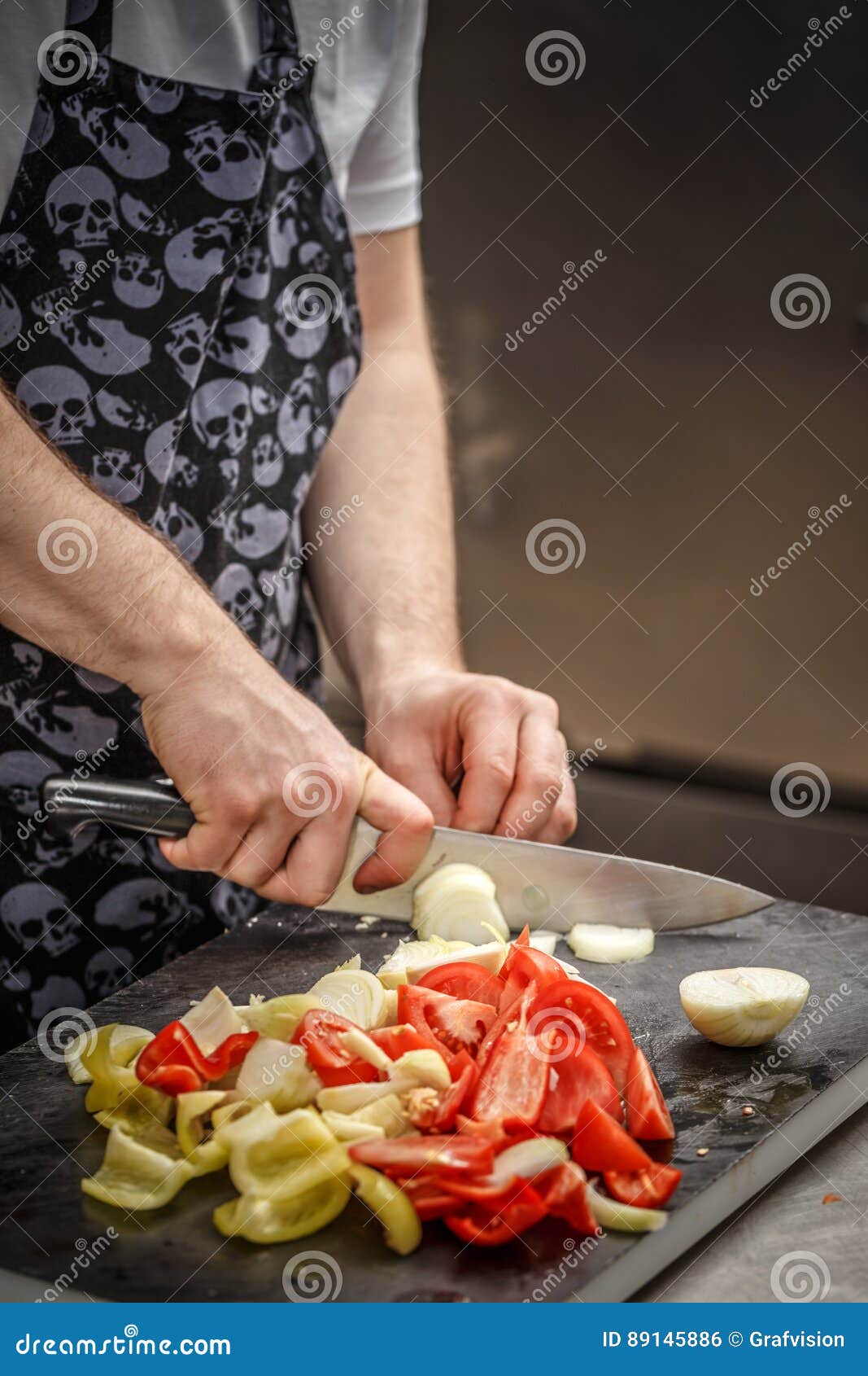 Chef is slicing vegetables stock photo. Image of chef - 89145886