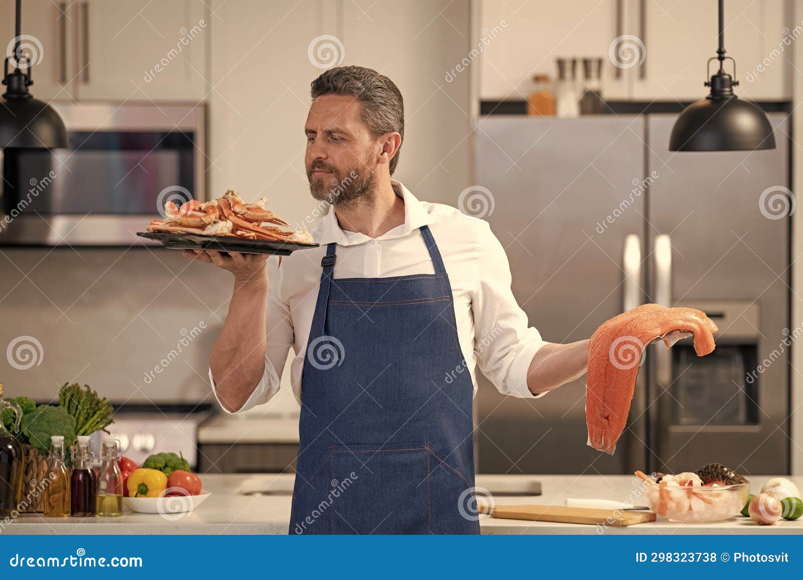 Chef Smell Lobster and Salmon Seafood in the Kitchen Stock Photo ...
