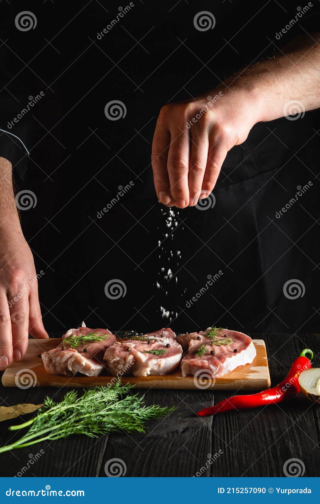 Chef Sprinkles the Meat with Salt. Preparing Meat before Baking Stock ...