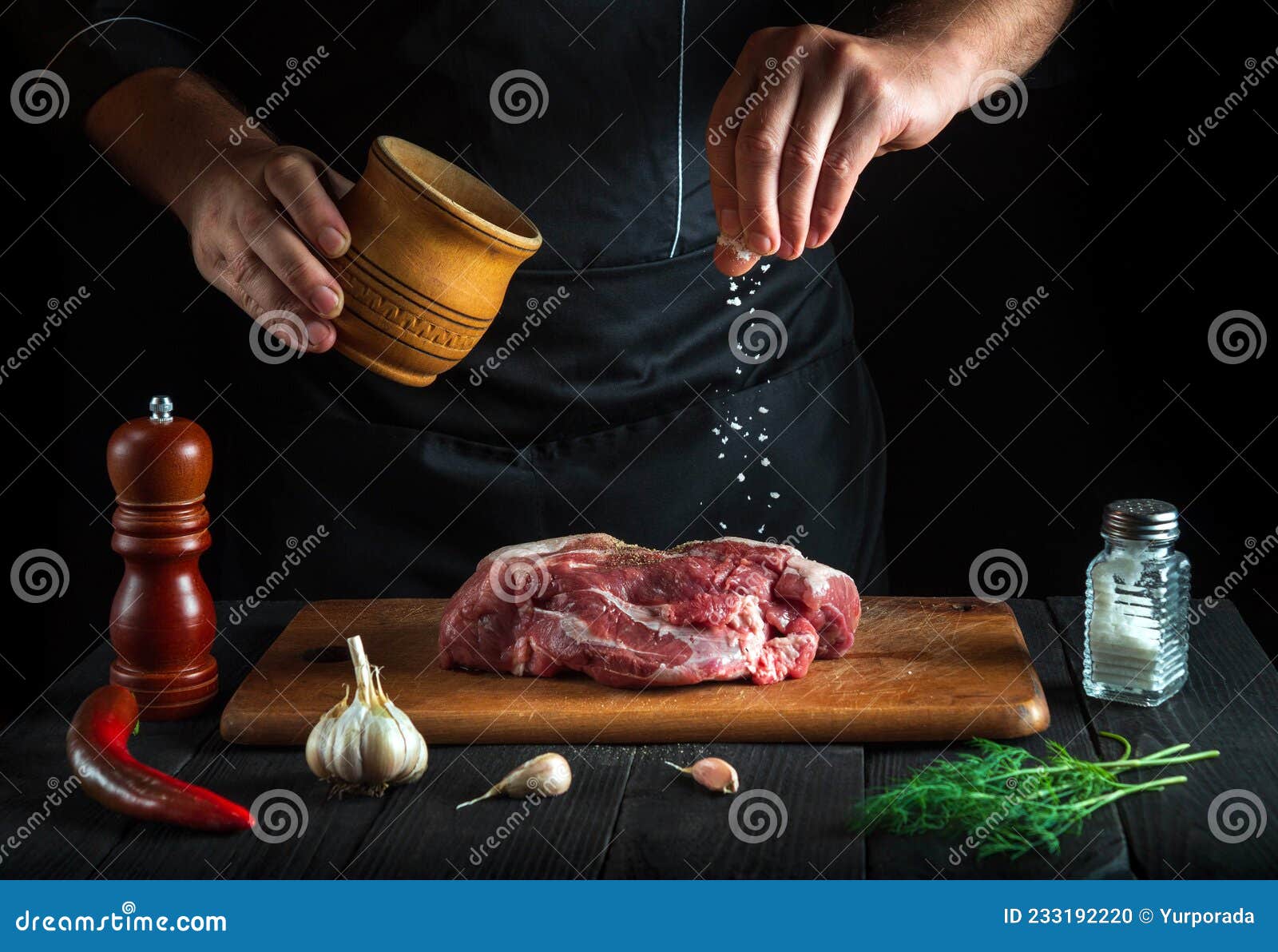 The Chef Sprinkles the Meat with Salt. Preparing Meat before Baking ...