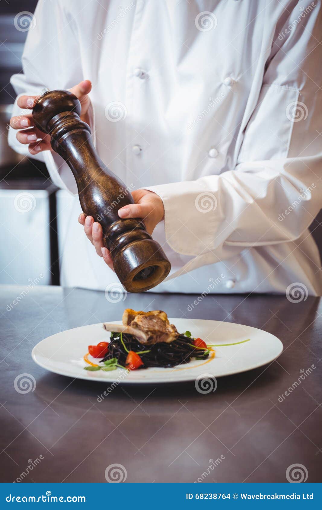 Chef Sprinkling Pepper on Dish Stock Photo - Image of chefs, person ...