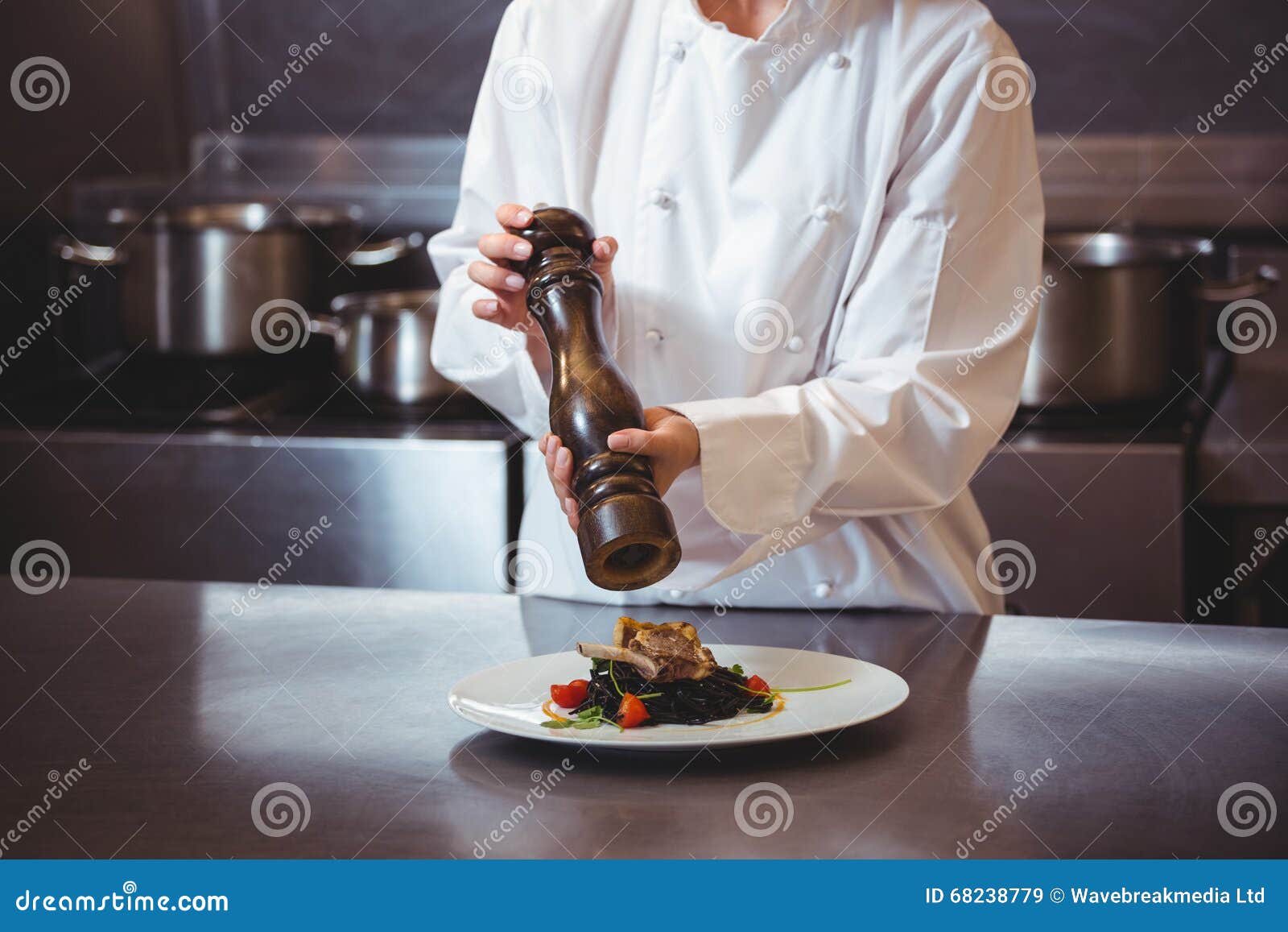 Chef Sprinkling Pepper on Dish Stock Image - Image of occupation, cook ...
