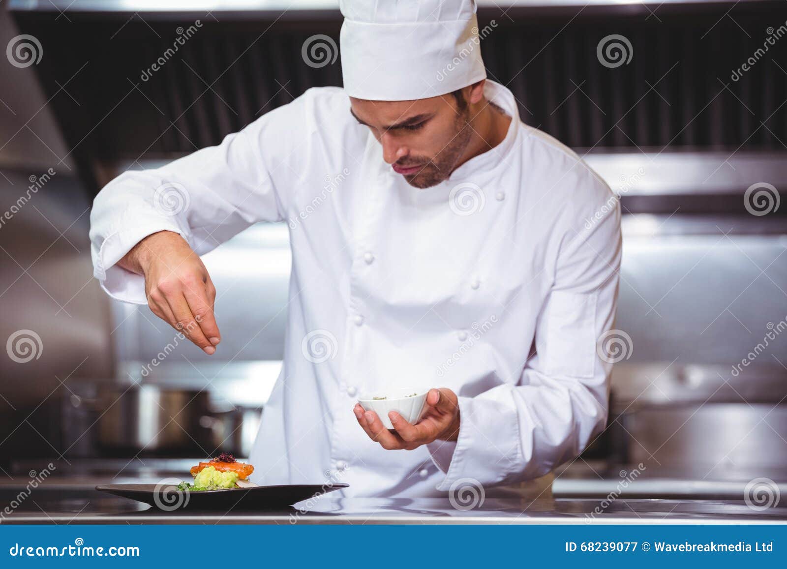 Chef Sprinkling Spices on Dish Stock Image - Image of adult, cooking ...