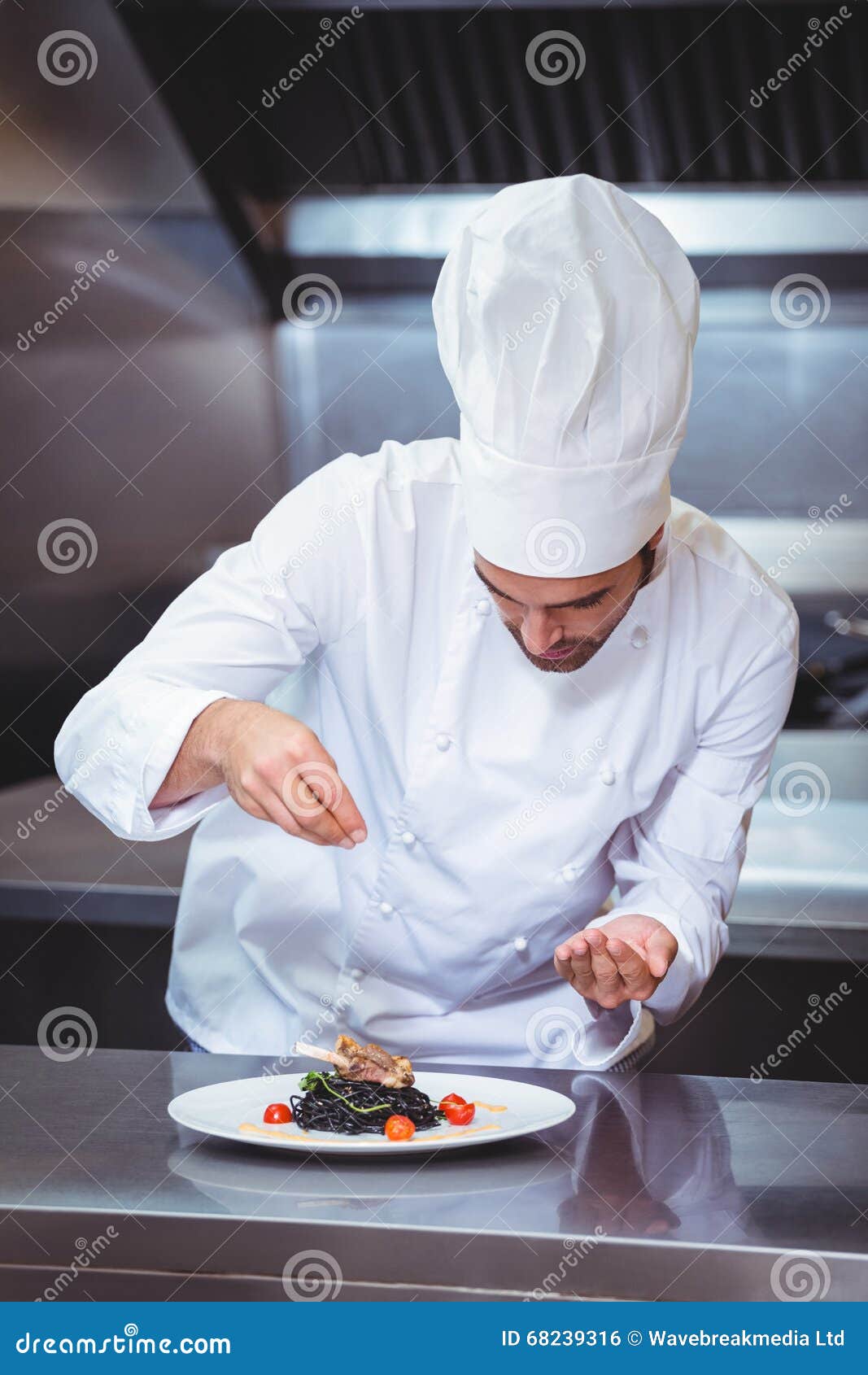 Chef Sprinkling Spices on Dish Stock Photo - Image of gastronomic ...