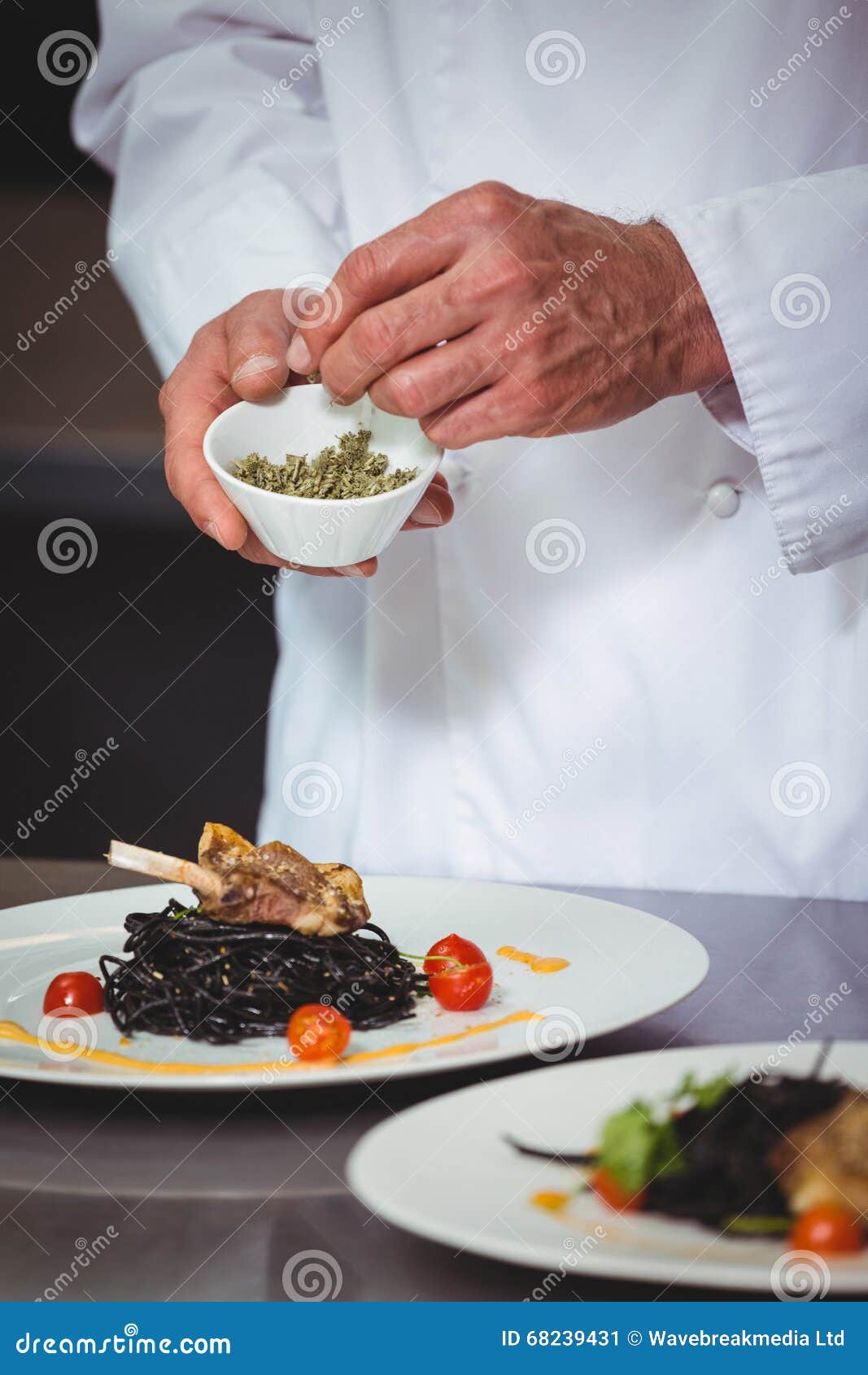 Chef Sprinkling Spices on Dish Stock Image - Image of indoors, hotel ...