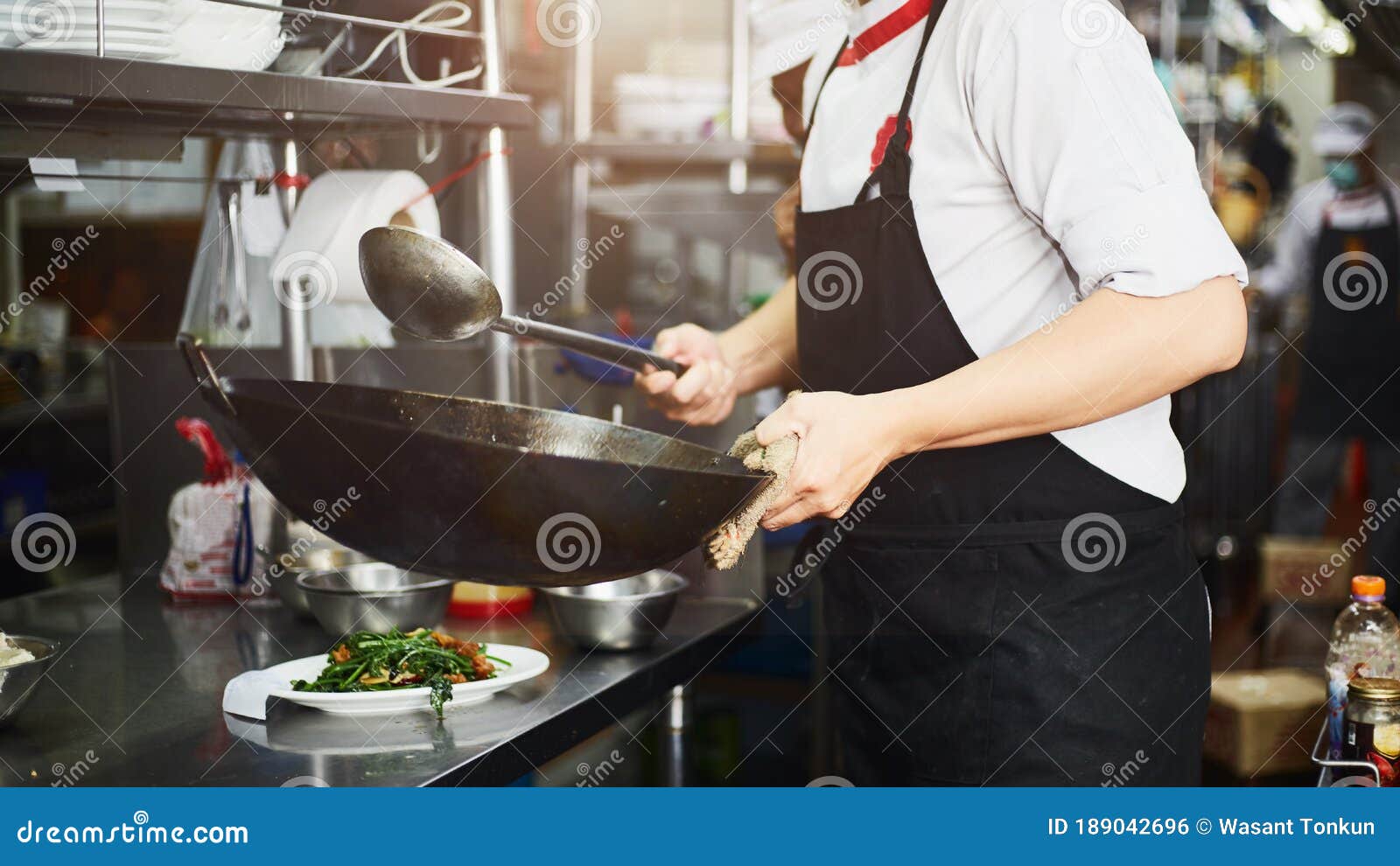Chef stir fry busy cooking stock photo. Image of stainless - 189042696