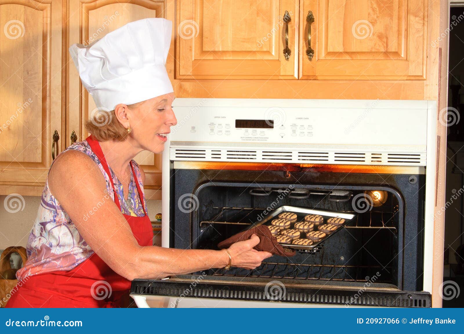 Chef Taking Cookies Out of Oven Stock Photo - Image of cooking, kitchen ...