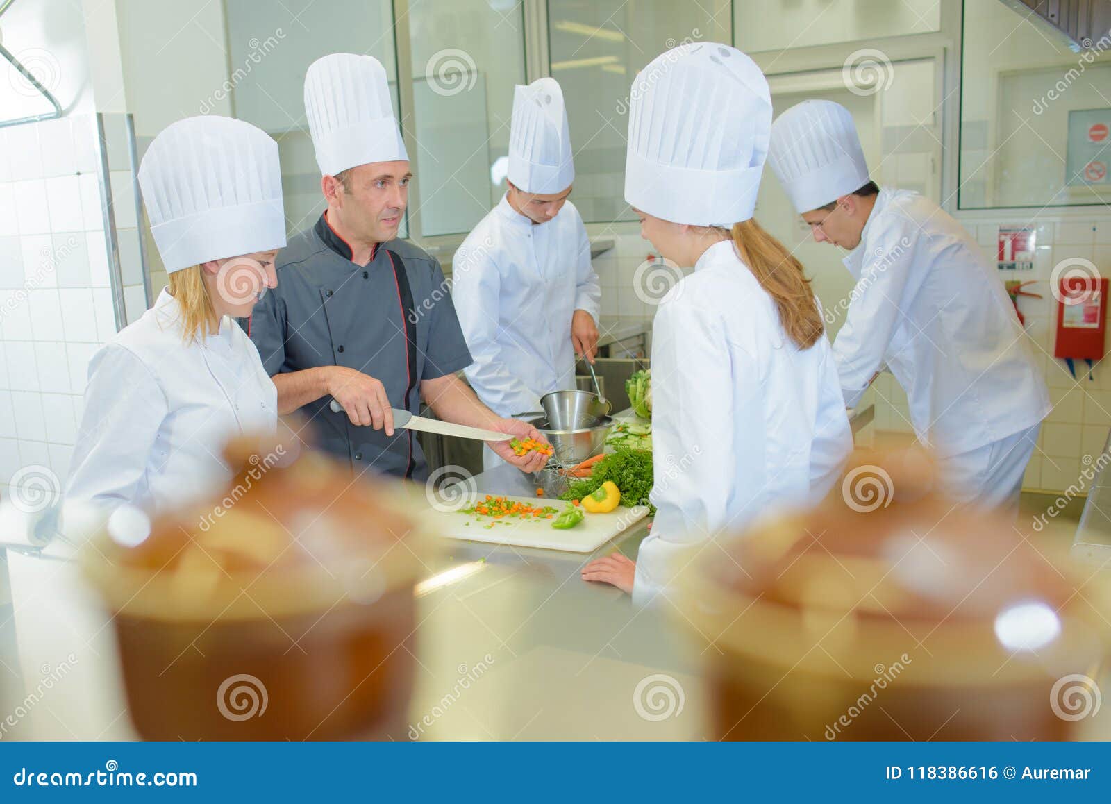 Chef Teaching Students on Cookery Course Stock Photo - Image of youth ...