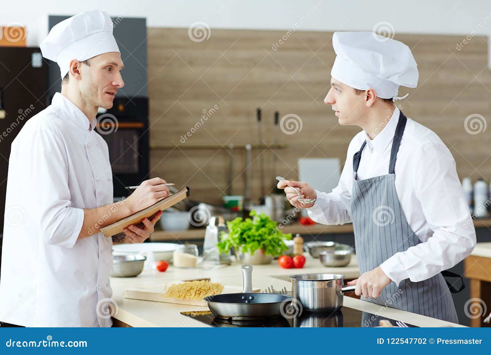Chef Testing Intern Cook at Kitchen Stock Photo - Image of cooking ...