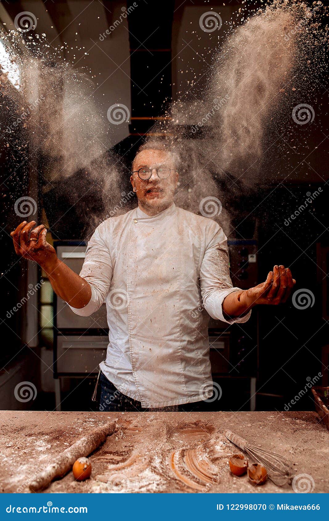 Chef Throws Flour and Cocoa Stock Photo - Image of powder, chef: 122998070