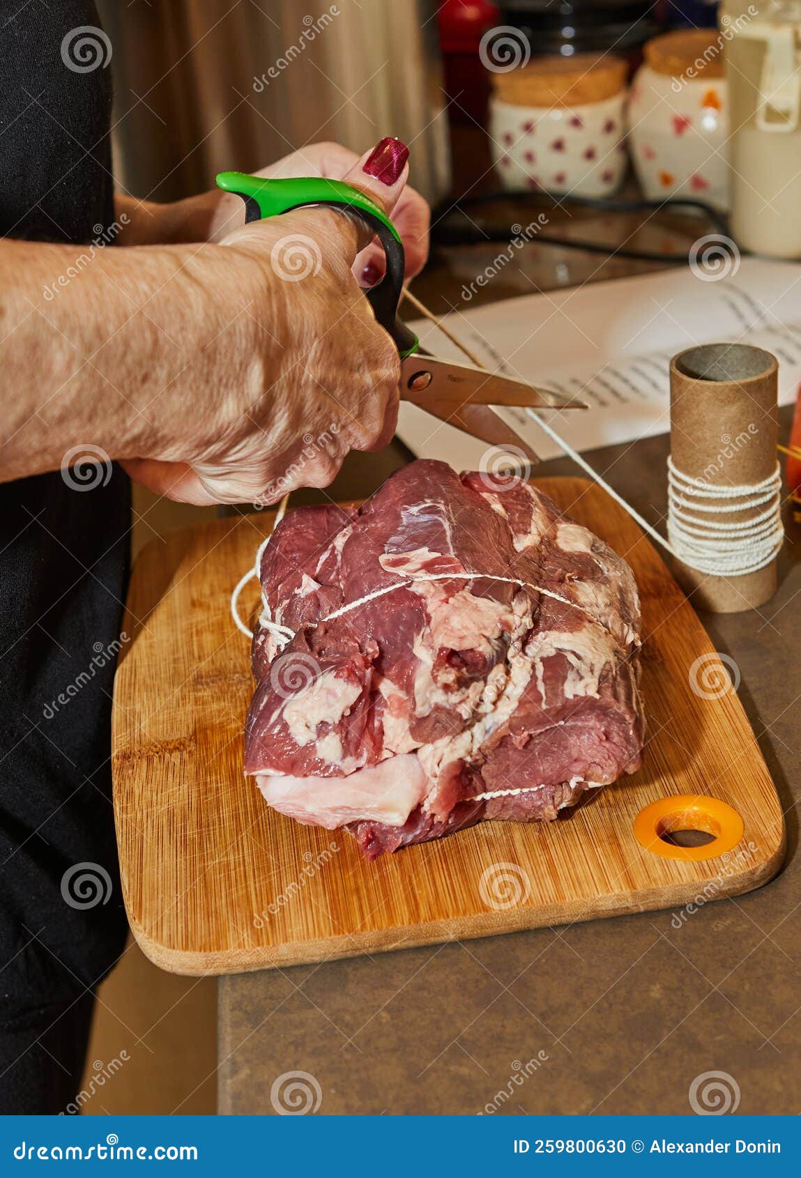 Chef Ties the Beef with Rope and Prepares it for Baking in the Oven ...