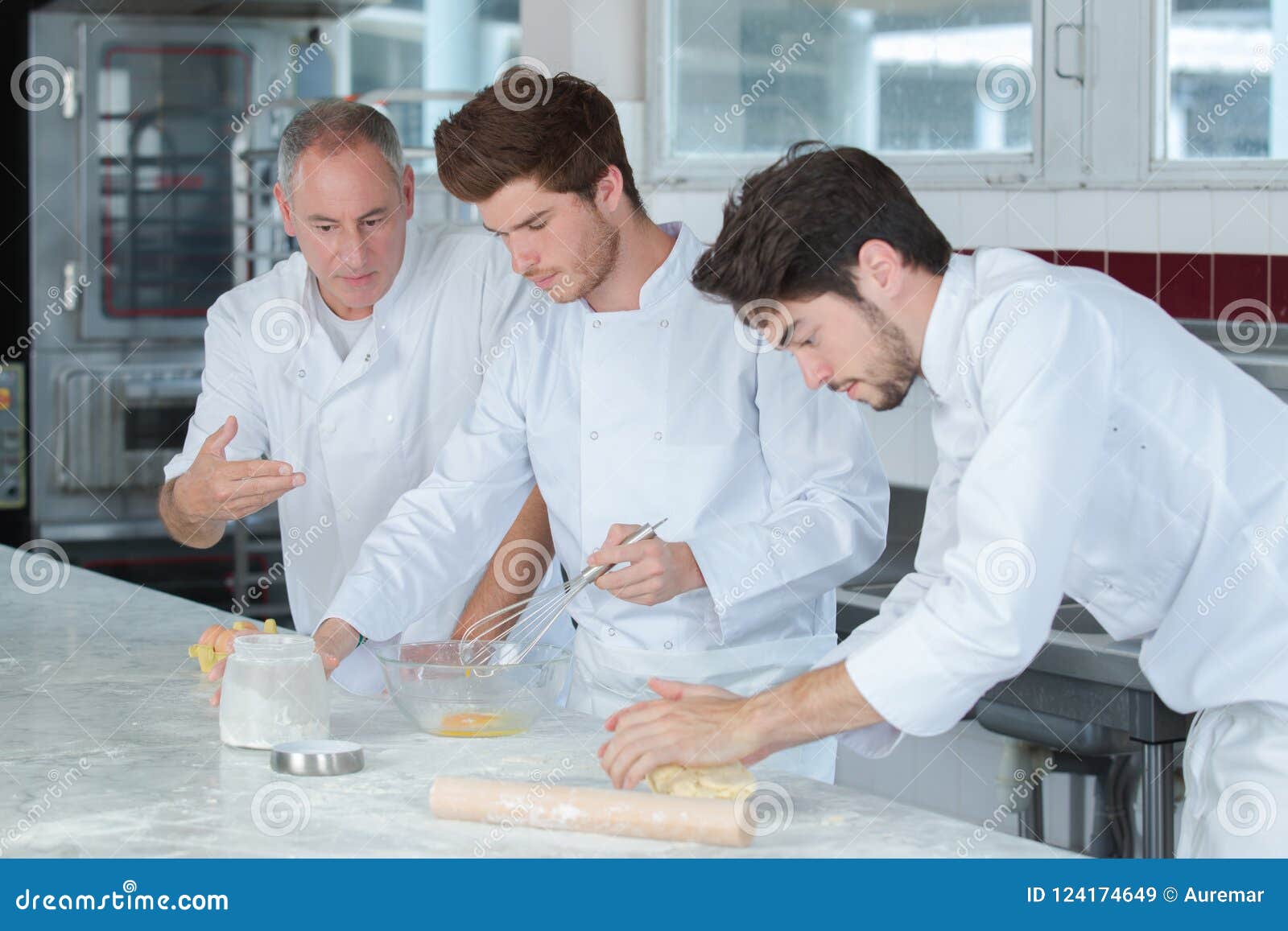 Chef and Trainees in Restaurant Kitchen Stock Image - Image of work ...