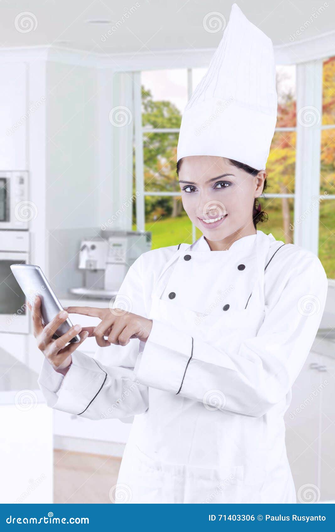 Chef Uses Mobile Phone in Kitchen Stock Photo - Image of cellphone ...