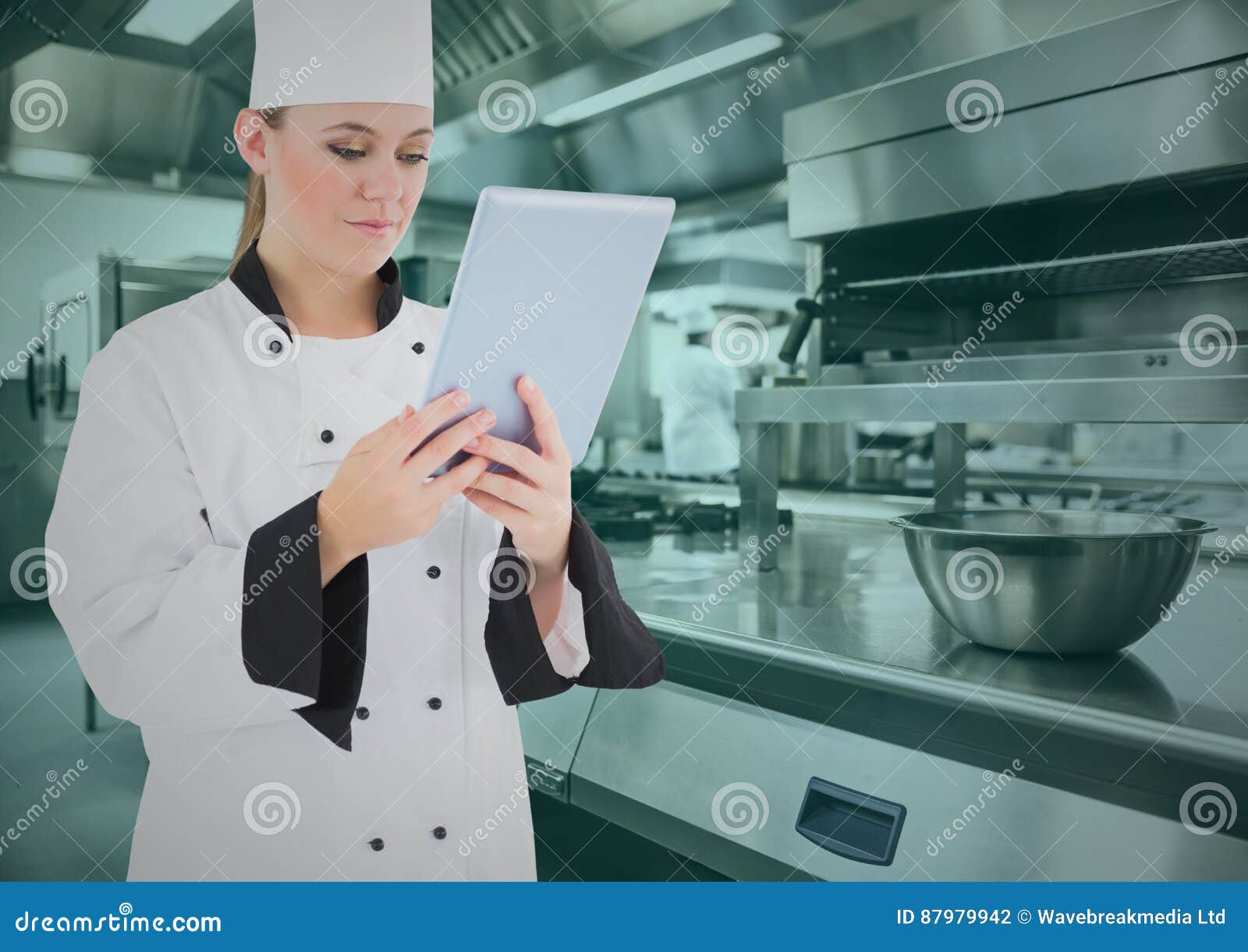 Chef Using Digital Tablet in Commercial Kitchen Stock Photo - Image of ...