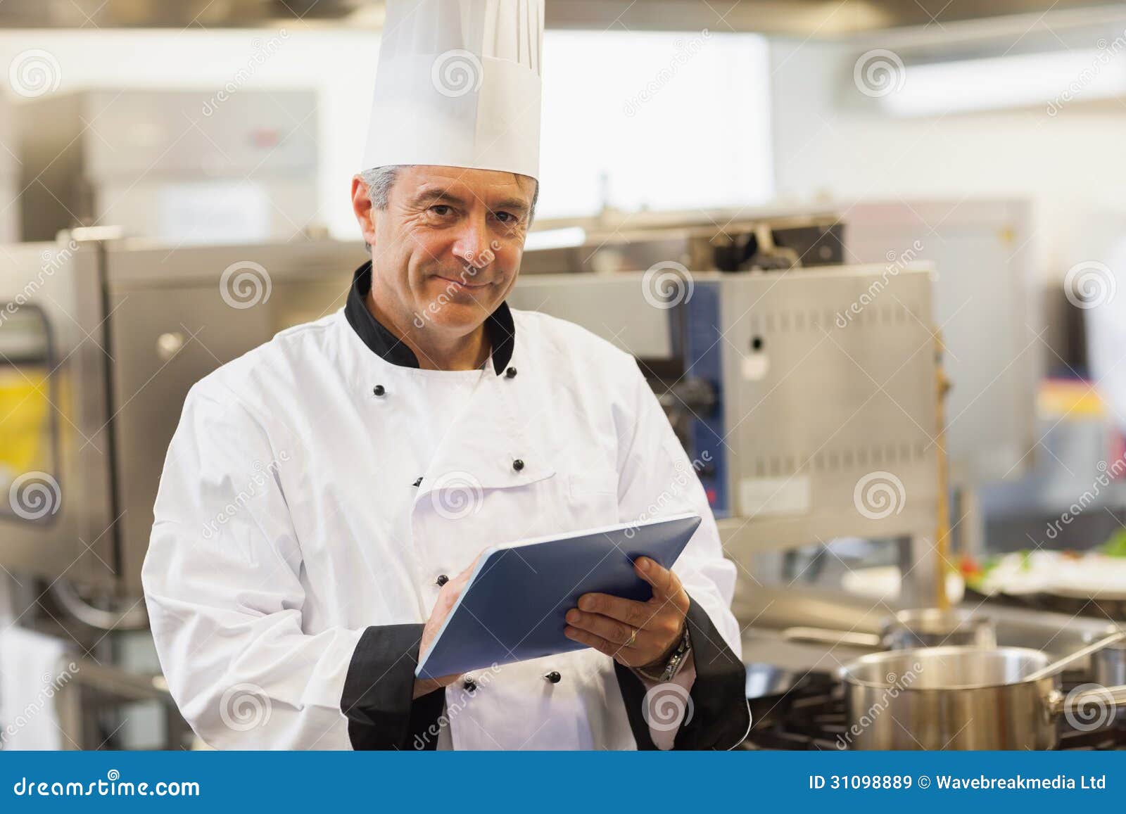 Chef Using His Digital Tablet and Looking at Camera Stock Image - Image ...