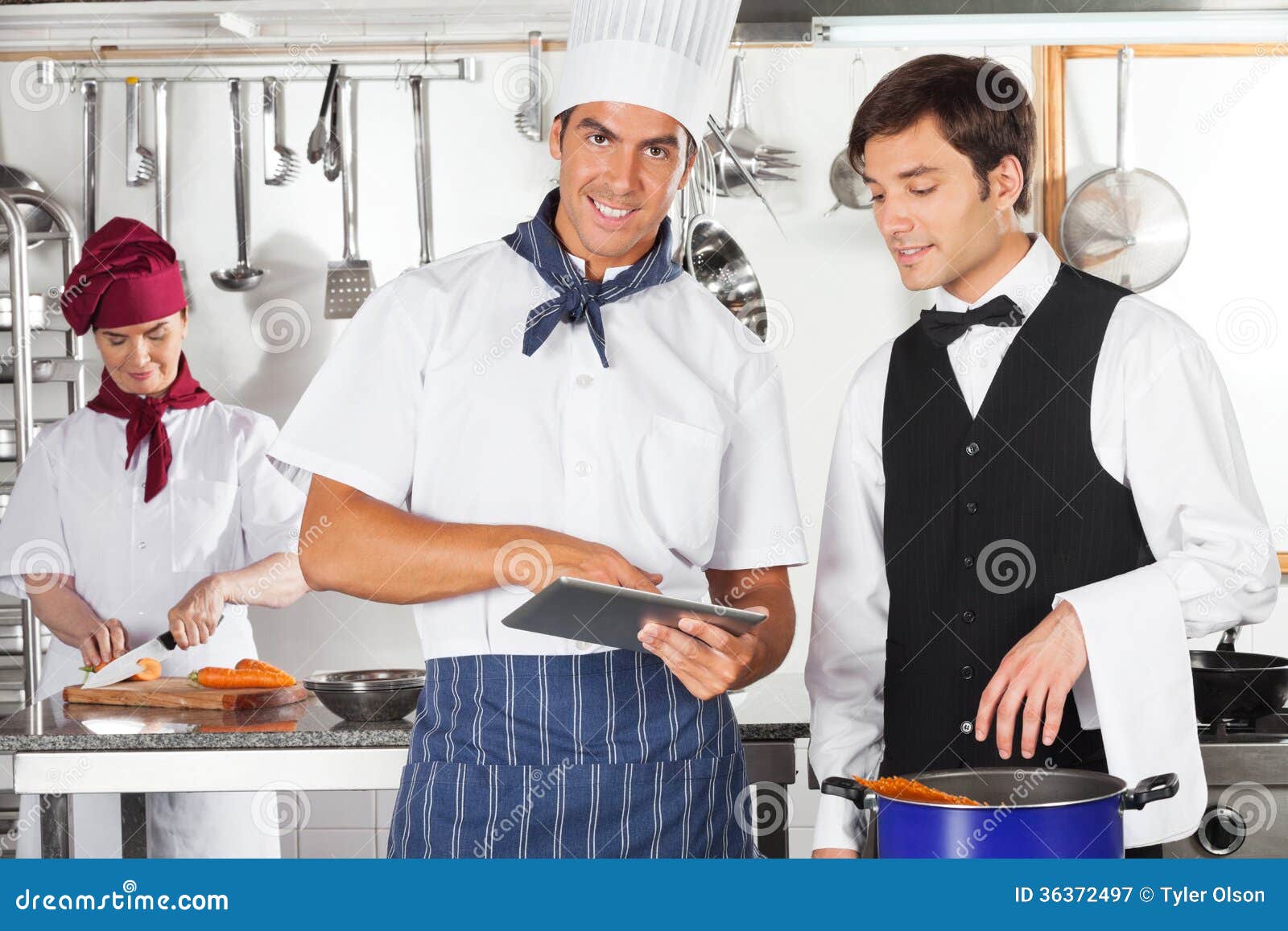 Chef with Waiter Using Digital Tablet Stock Image - Image of digital ...