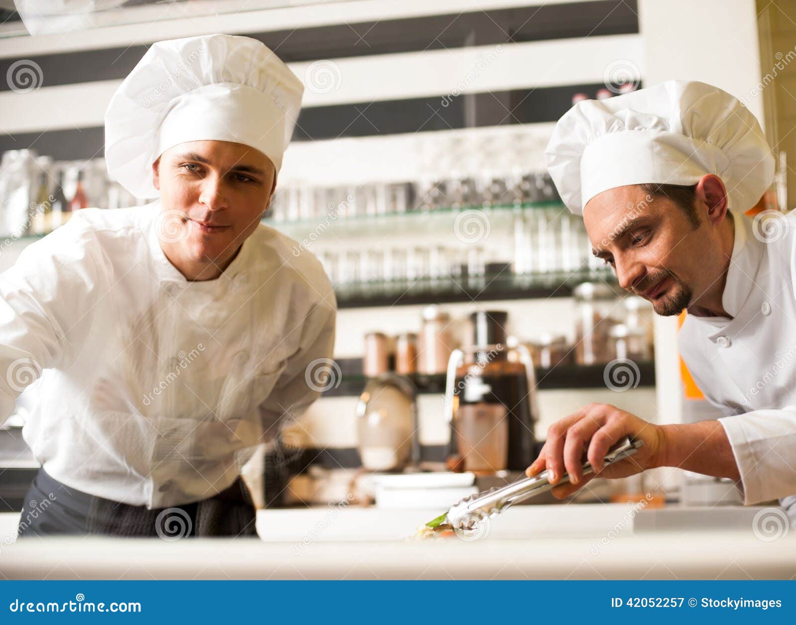 Chef Watching His Assistant Arranging Dish Stock Image - Image of ...