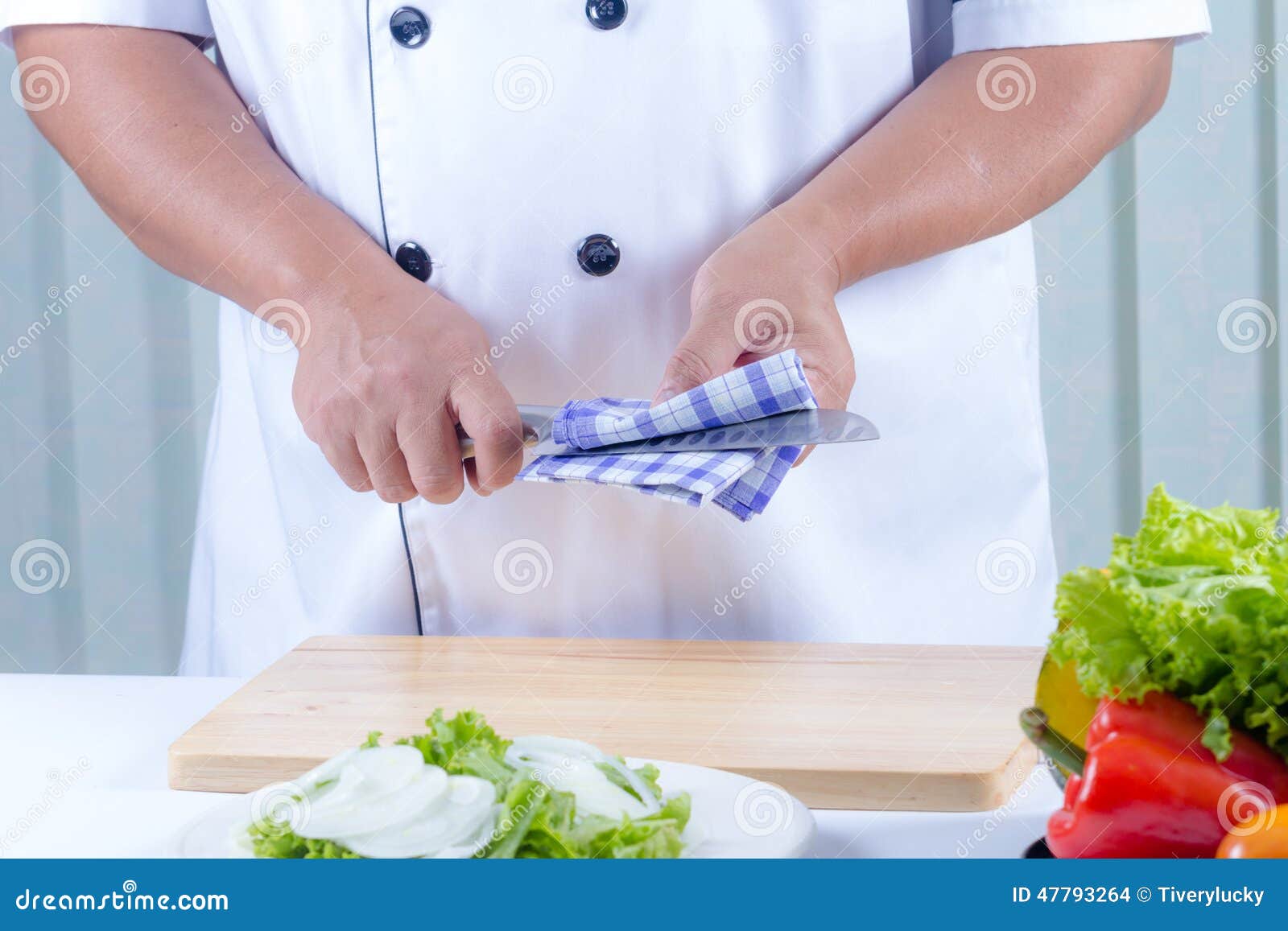 Chef wipe the knife stock photo. Image of sink, hands - 47793264