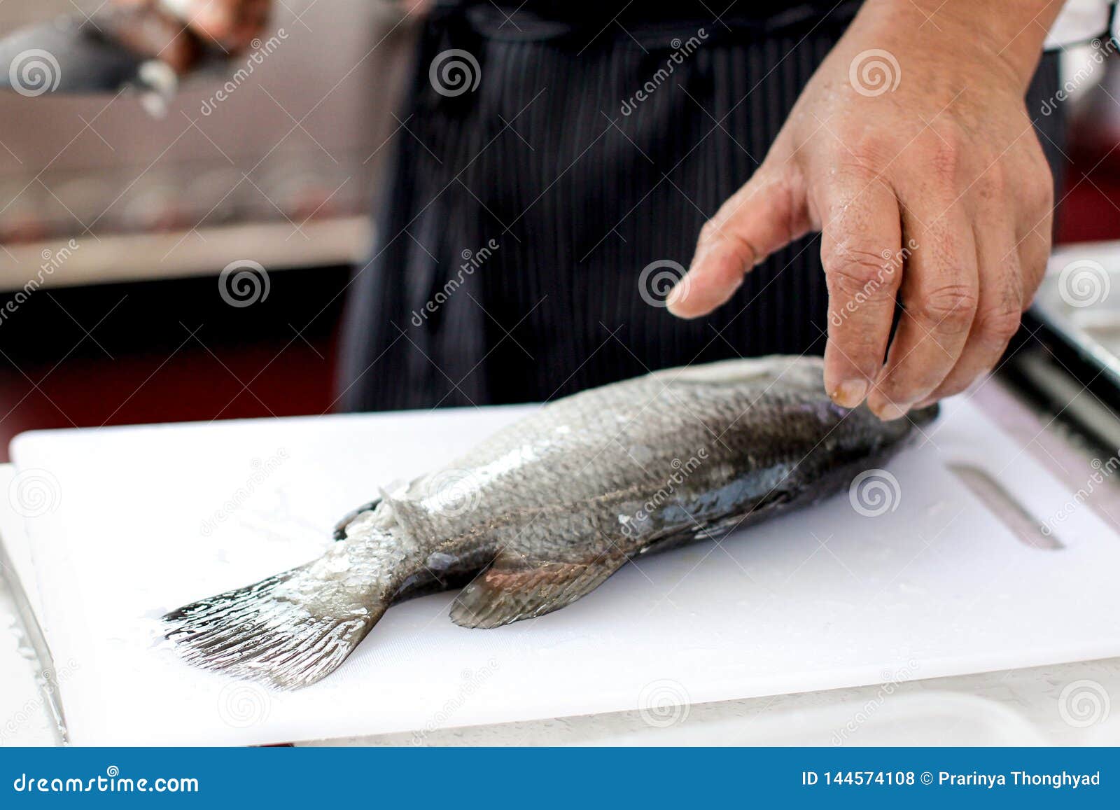 Chef at Work, Chef Filleting Fish at the Kitchen, Chef in Restaurant ...