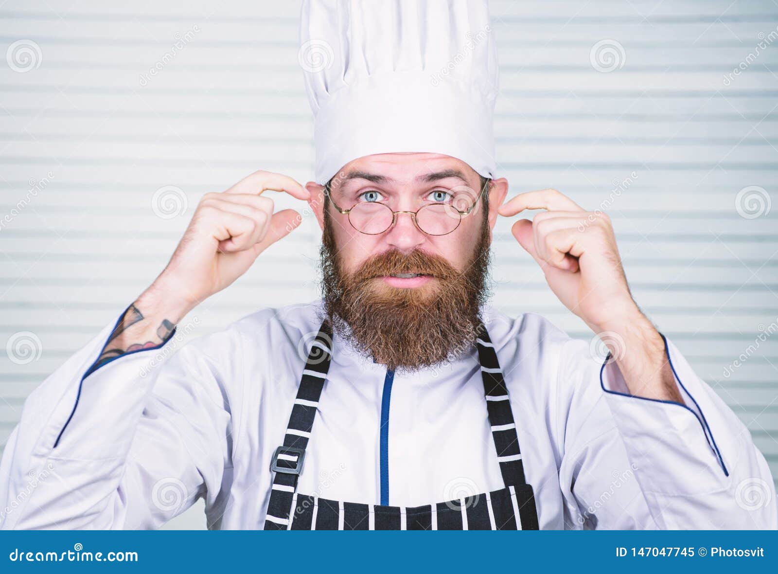 Chef at Work Starting Shift. Guy in Professional Uniform Ready Cook ...