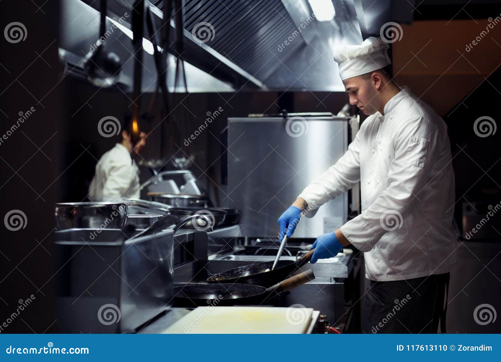 Chef Working on the Kitchen Stock Photo - Image of expert, cooker ...